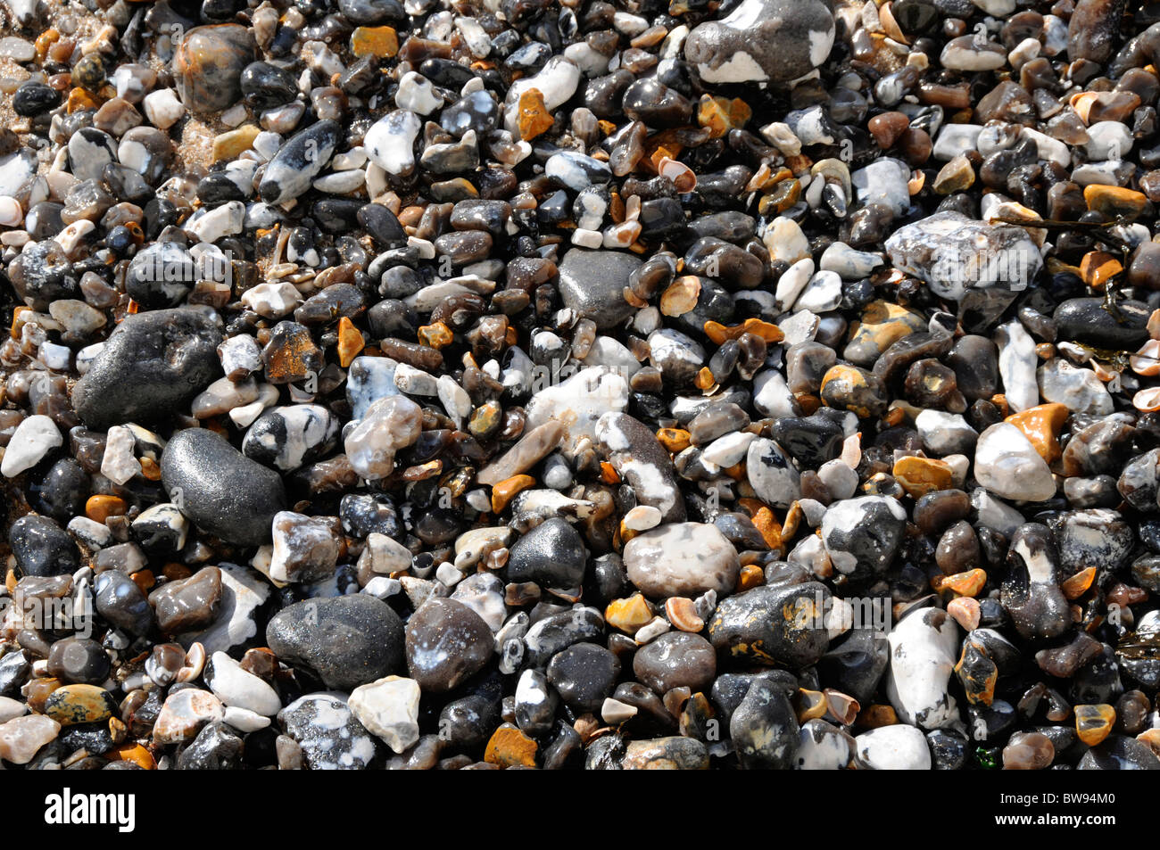 Wet shingle and pebbles seen from above Stock Photo - Alamy