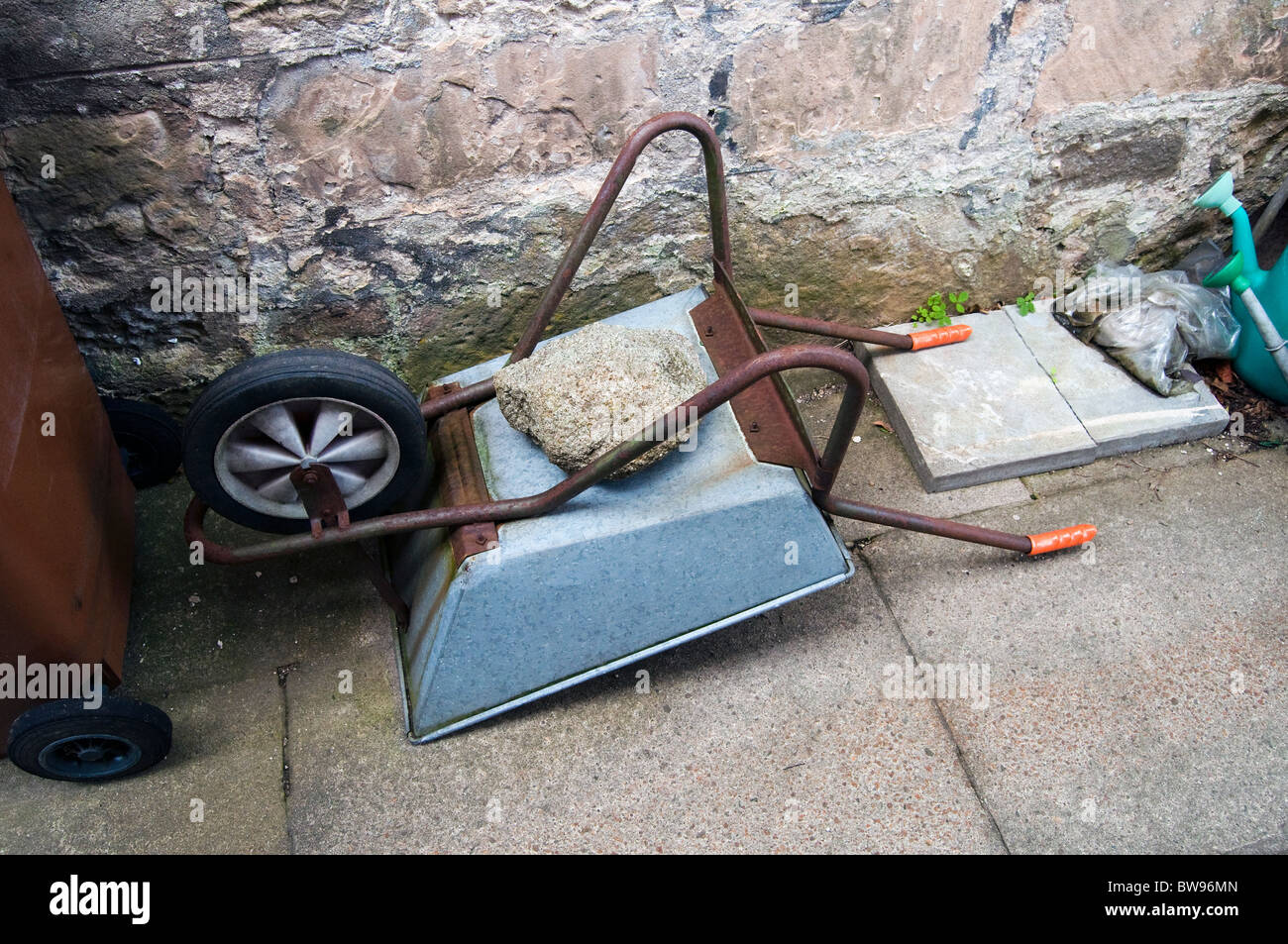 Wheel of upturned barrow hi-res stock photography and images - Alamy