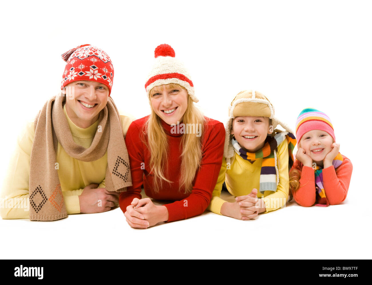 Happy family members looking at camera with smiles over white ...