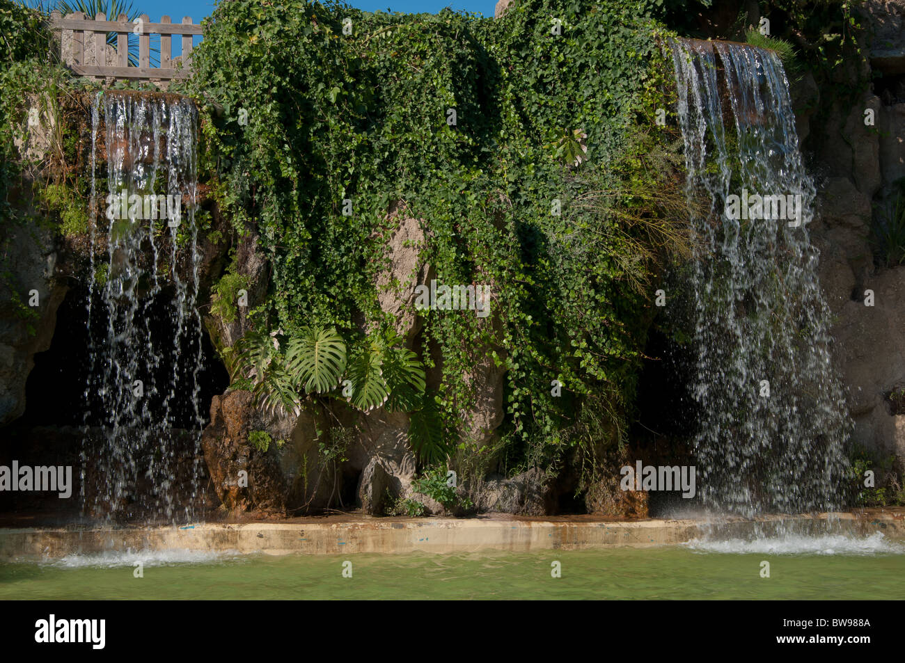 Waterfall and grotto in the Genoves park of Cadiz Stock Photo - Alamy