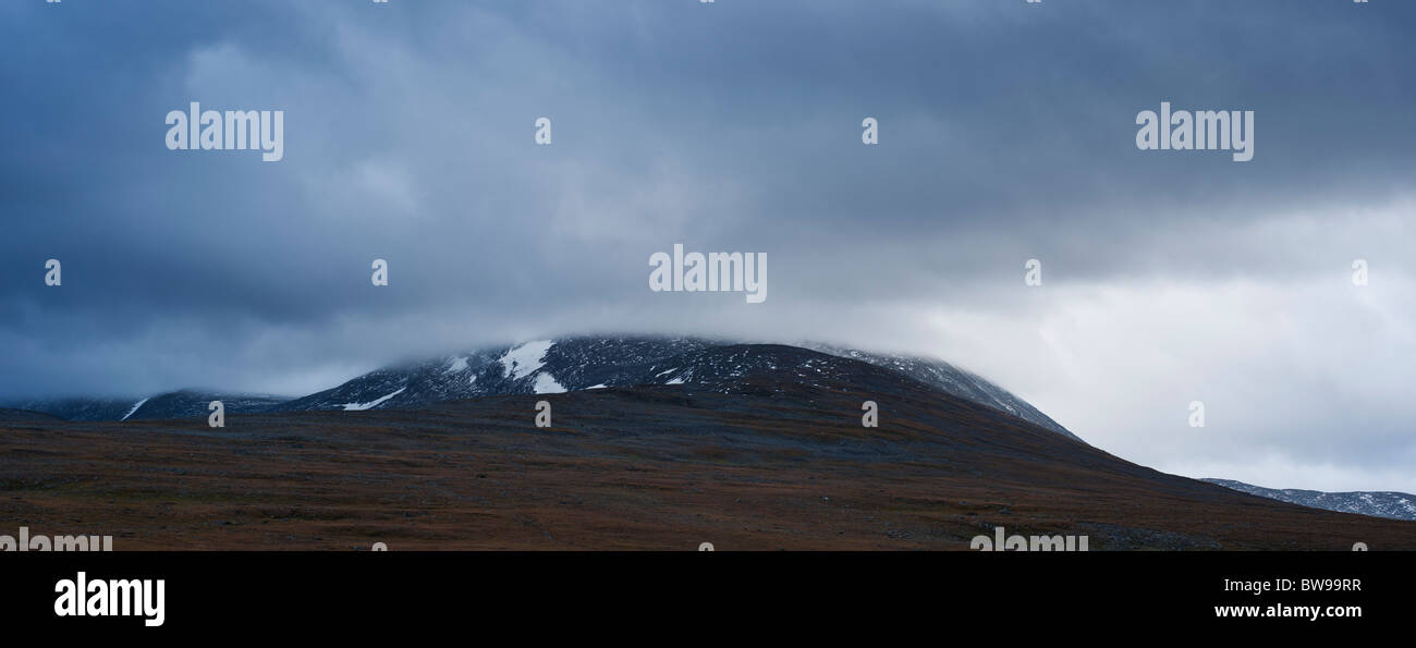 isolated mountain peak hidden in clouds, Lapland, Sweden Stock Photo ...
