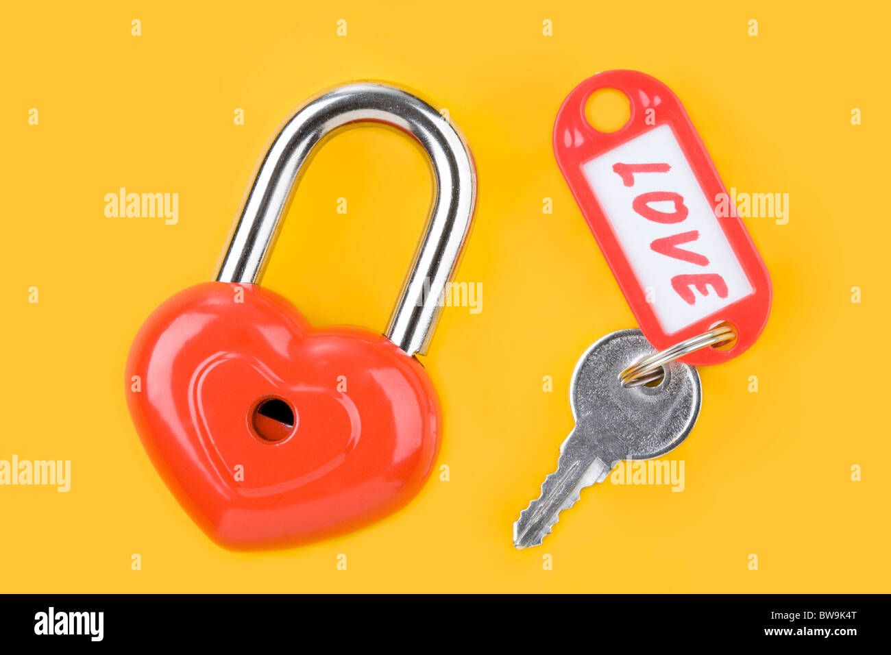 Image of red lock and key with love label Stock Photo - Alamy