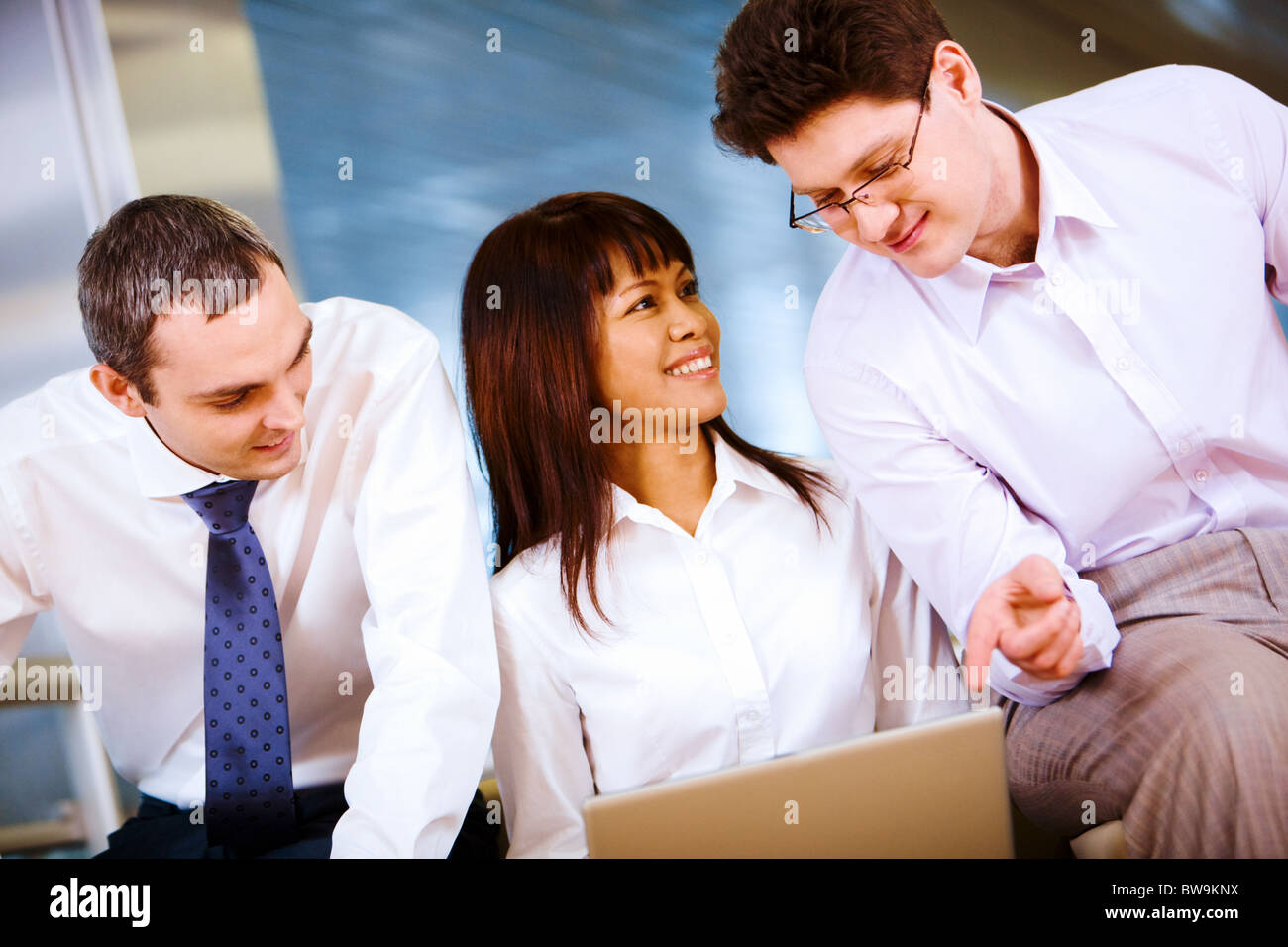 Photo of confident employees interacting at working meeting Stock Photo ...
