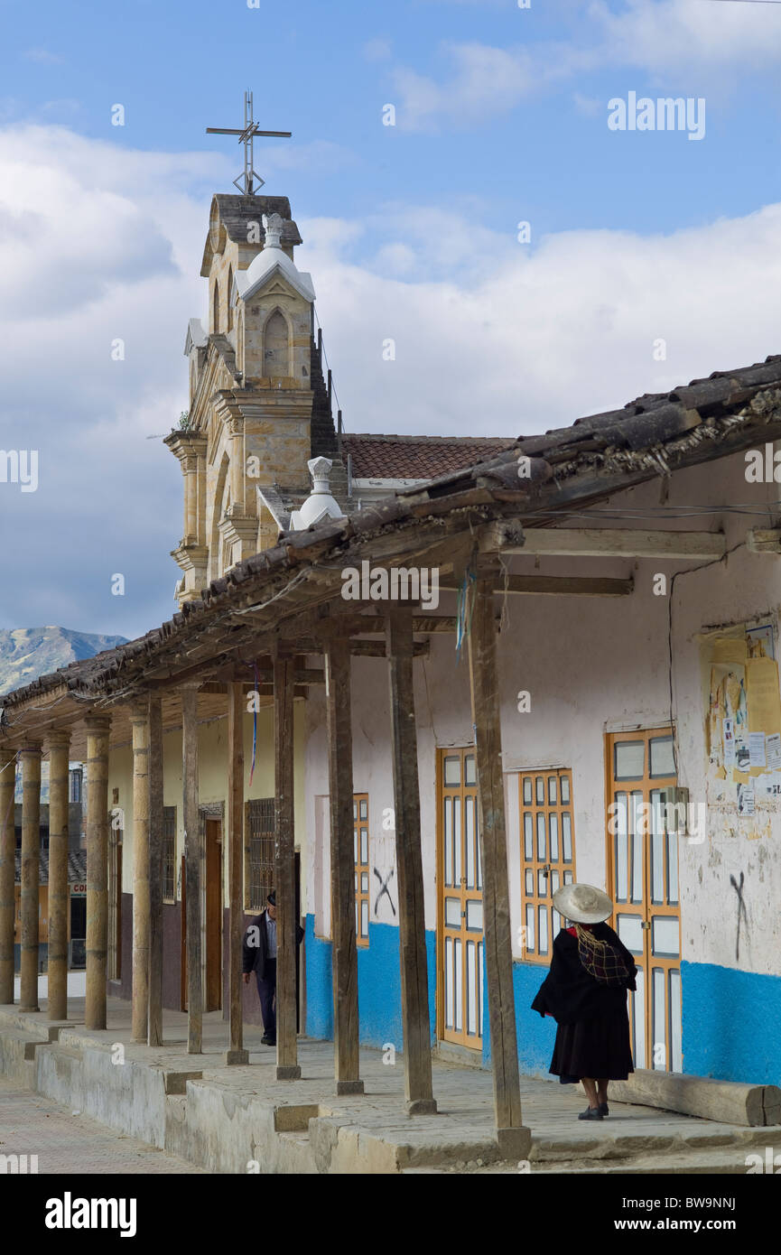 Indigenous woman walking down street, Saraguro, Ecuador Stock Photo - Alamy