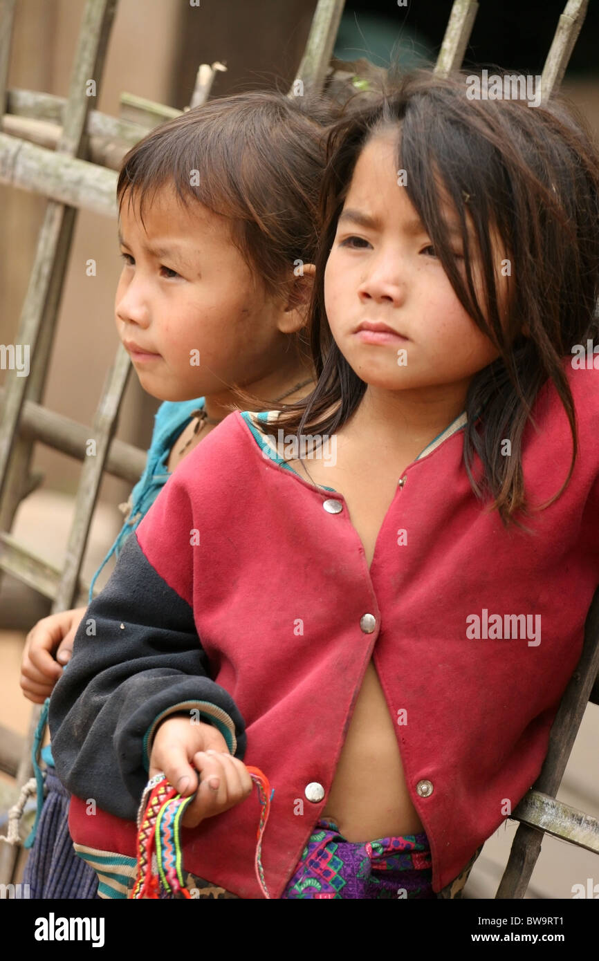 Hmong Children selling bracelets to tourists in a small village between ...