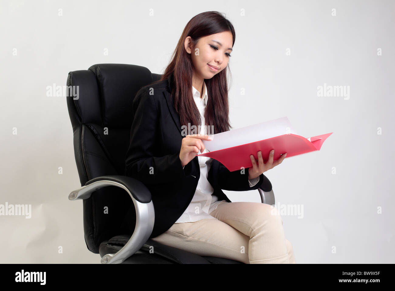 Office lady with files Stock Photo - Alamy