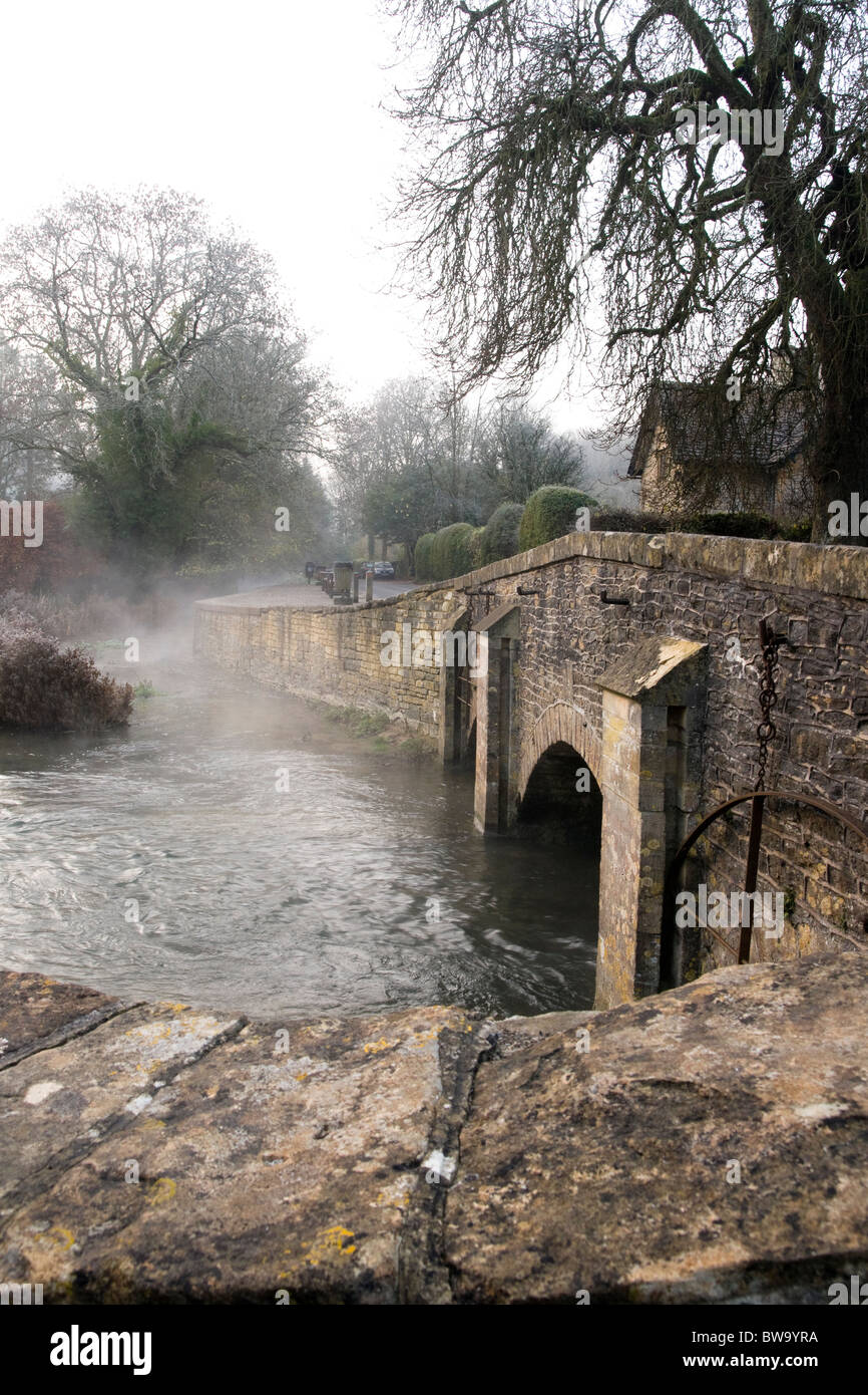 Mist on the river at Castle Combe Wiltshire England Stock Photo - Alamy