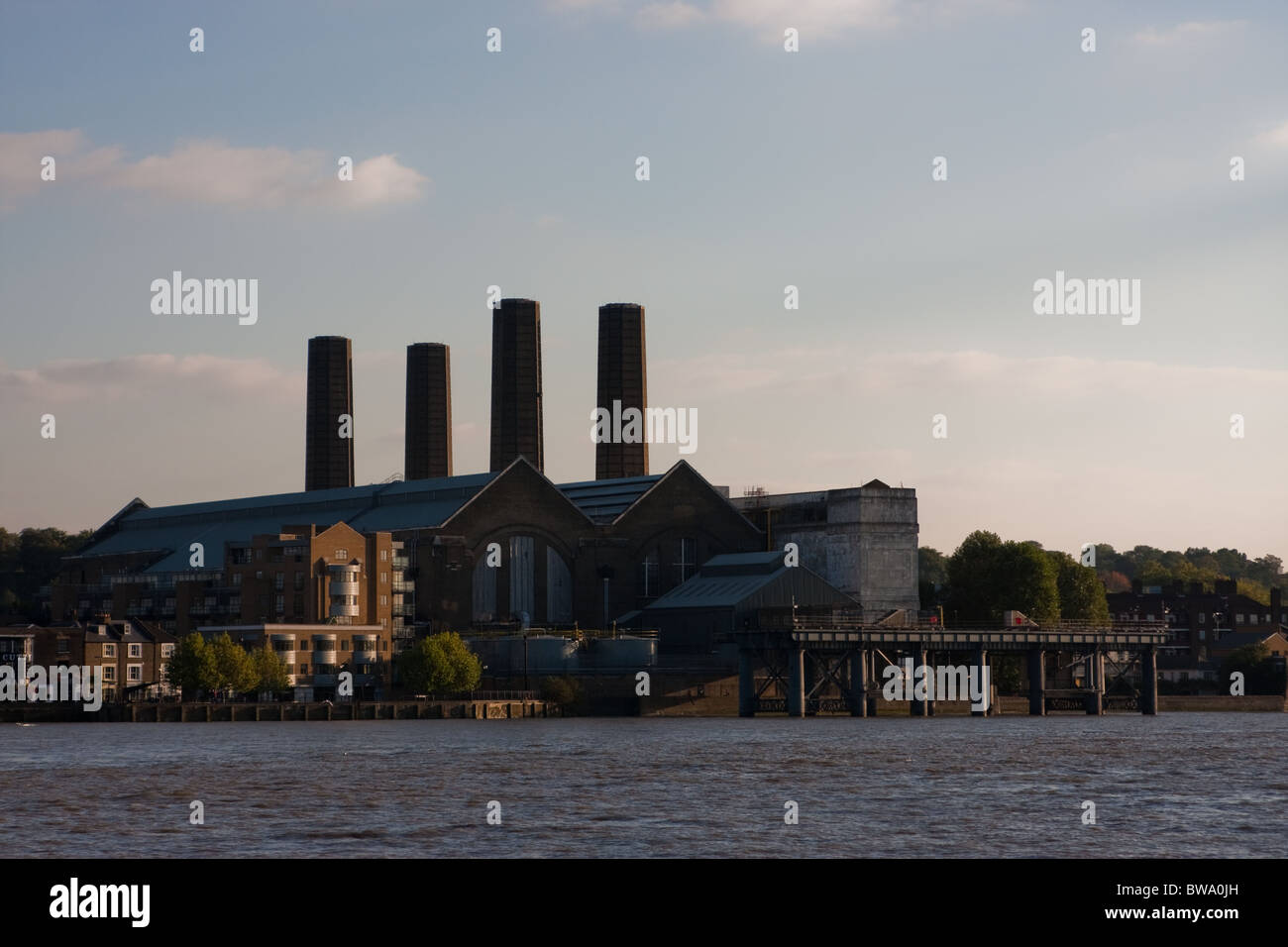 Greenwich Power Station, on the banks of the River Thames, in London ...