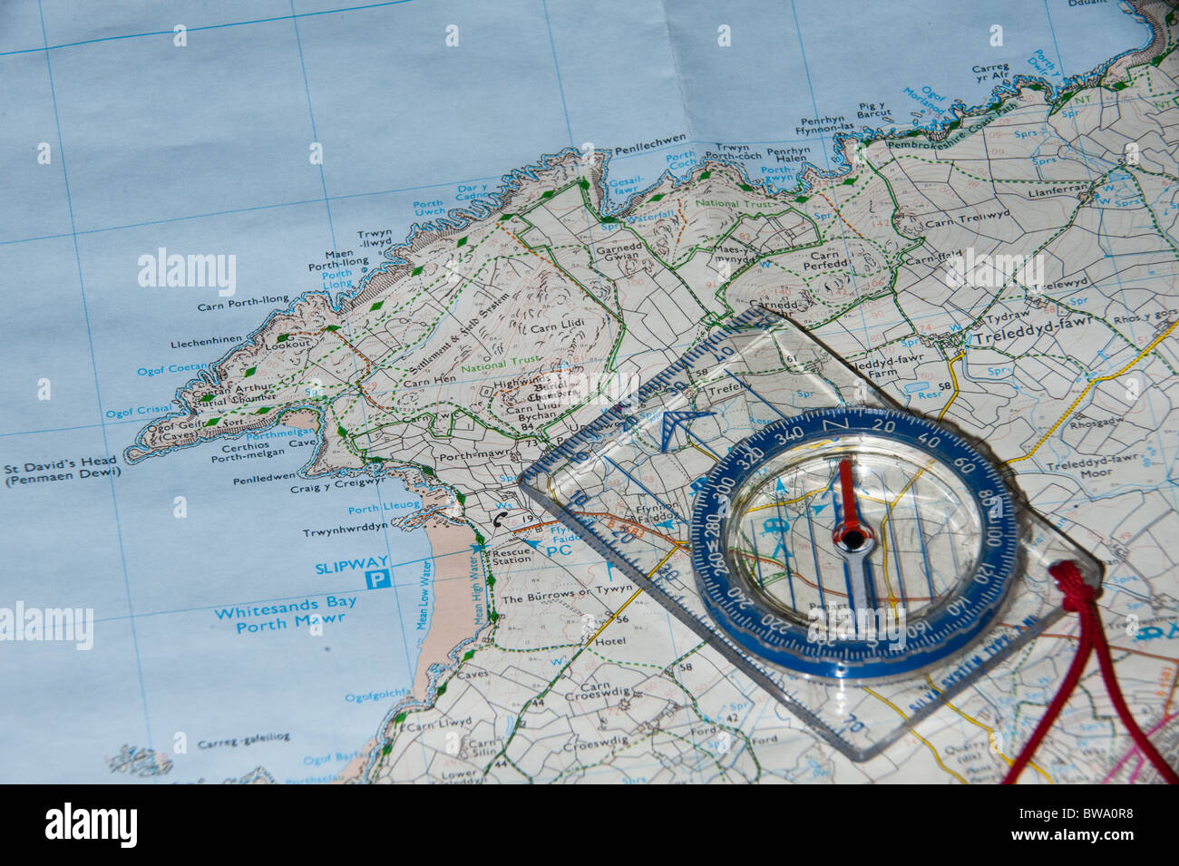 A Map and Compass being used for route planning Stock Photo - Alamy
