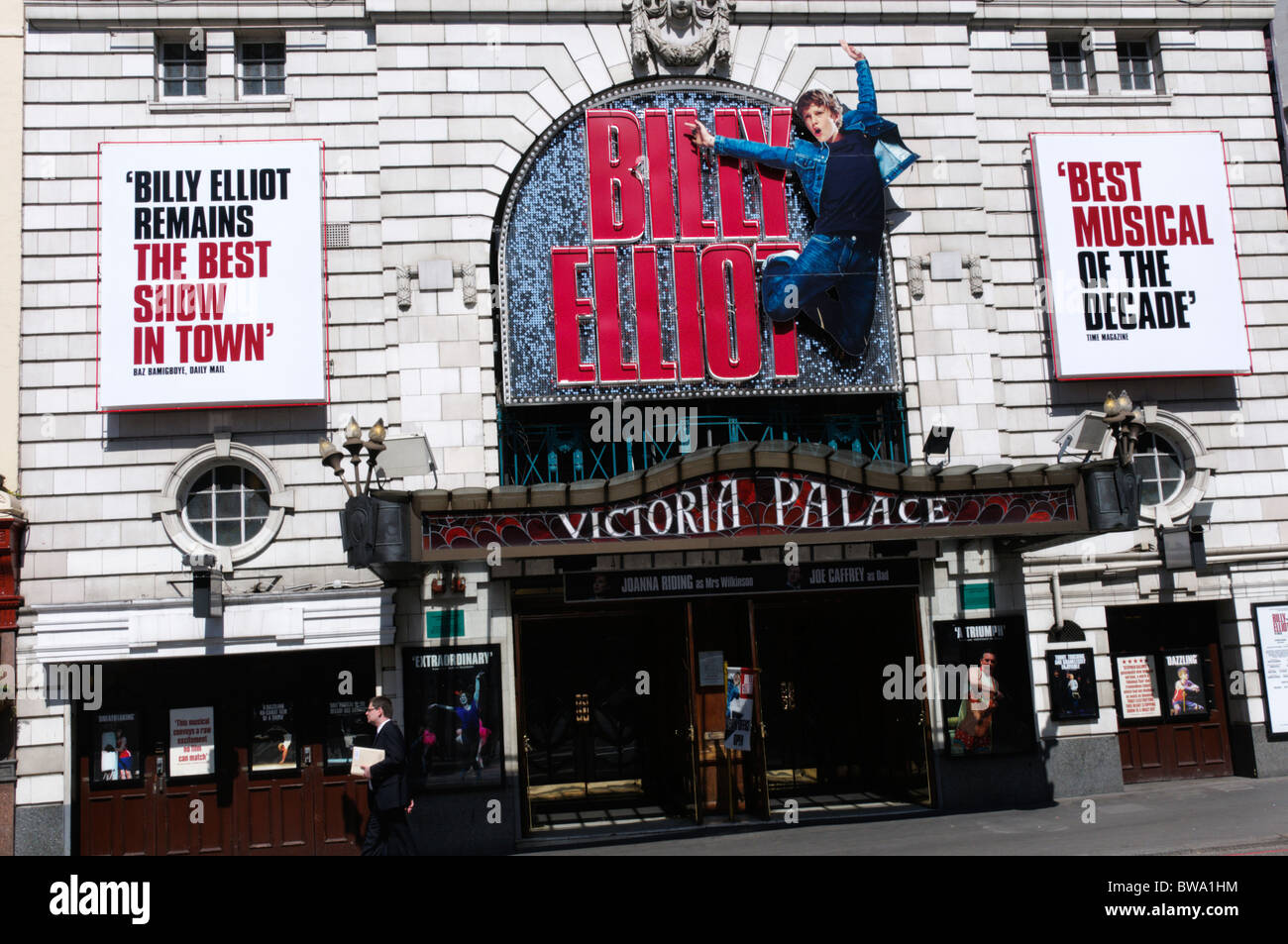 The front of the Victoria Palace Theatre in London advertising the show 'Billy Elliot' Stock ...