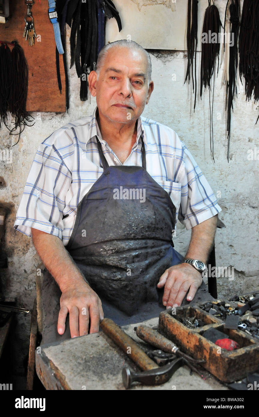 A shoemaker in his workshop Stock Photo - Alamy