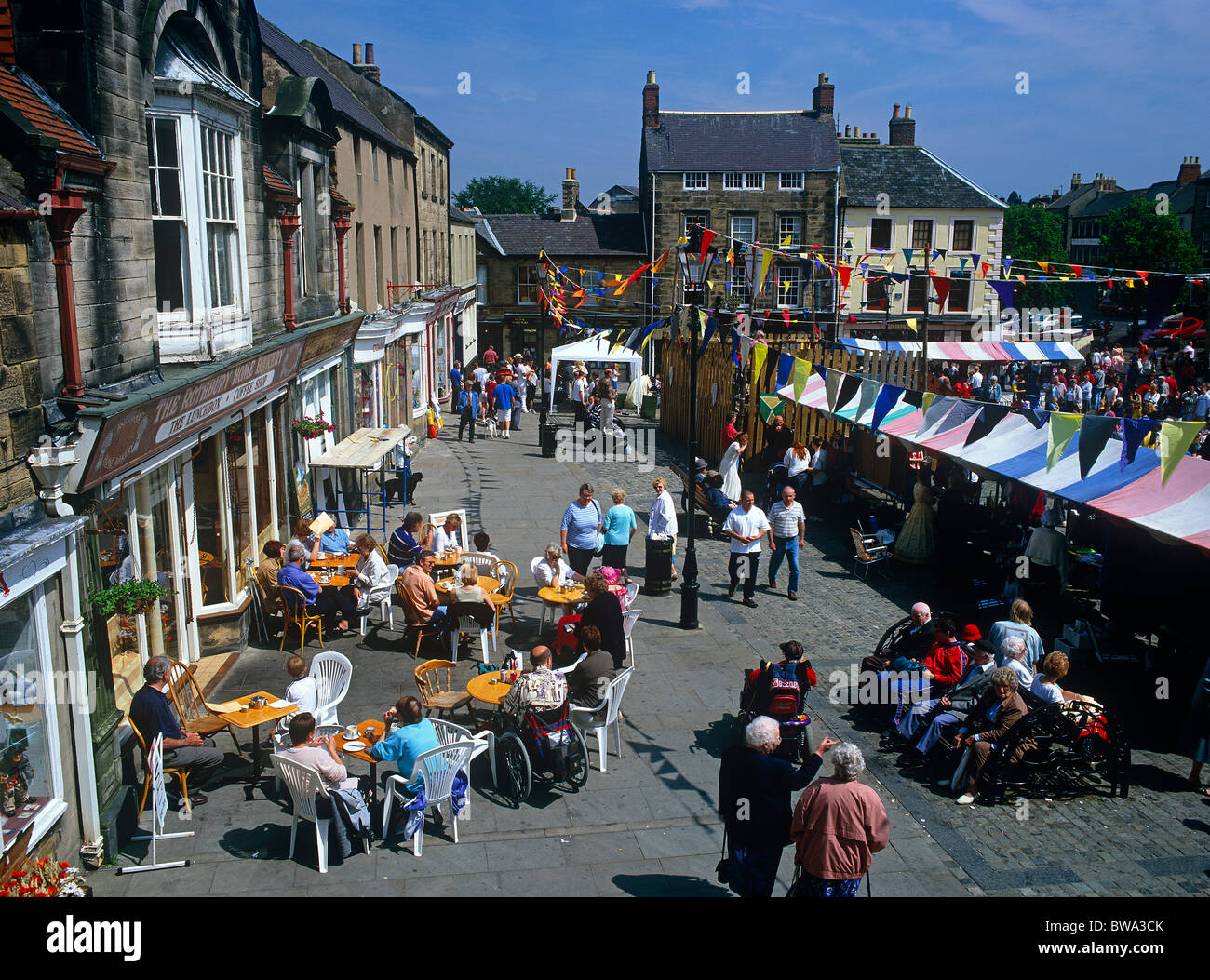 Relaxing at Alnwick fair, Alnwick, Northumberland Stock Photo - Alamy
