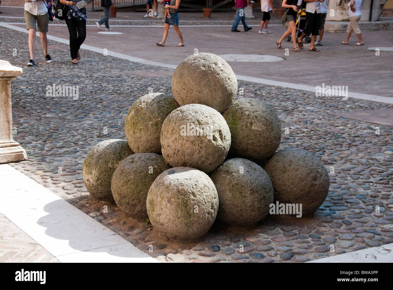 Stone cannon balls in the coutyard of Castle Estense, Ferrara Stock ...