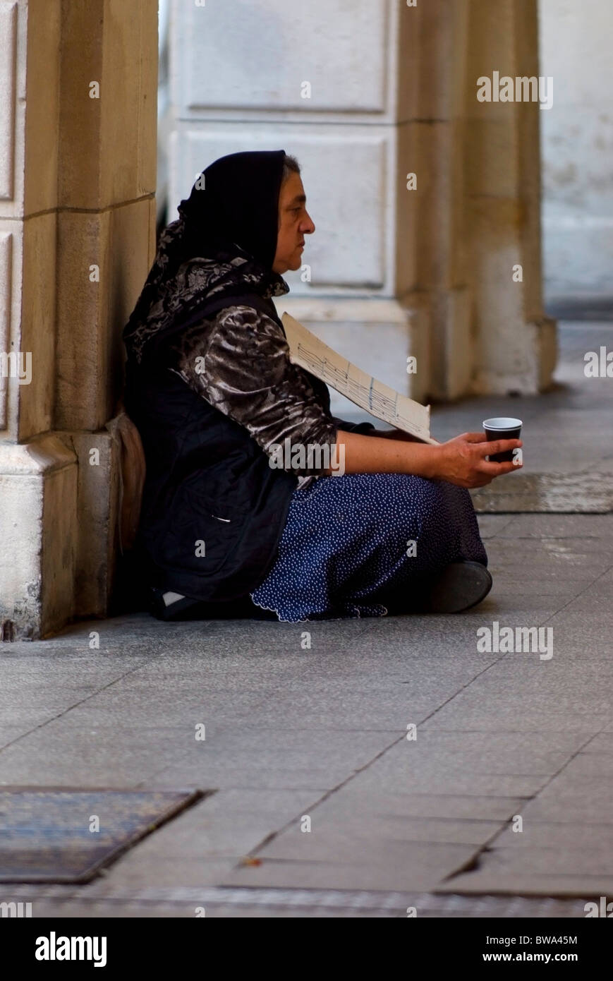 A Woman Begging on the Street Stock Photo - Alamy
