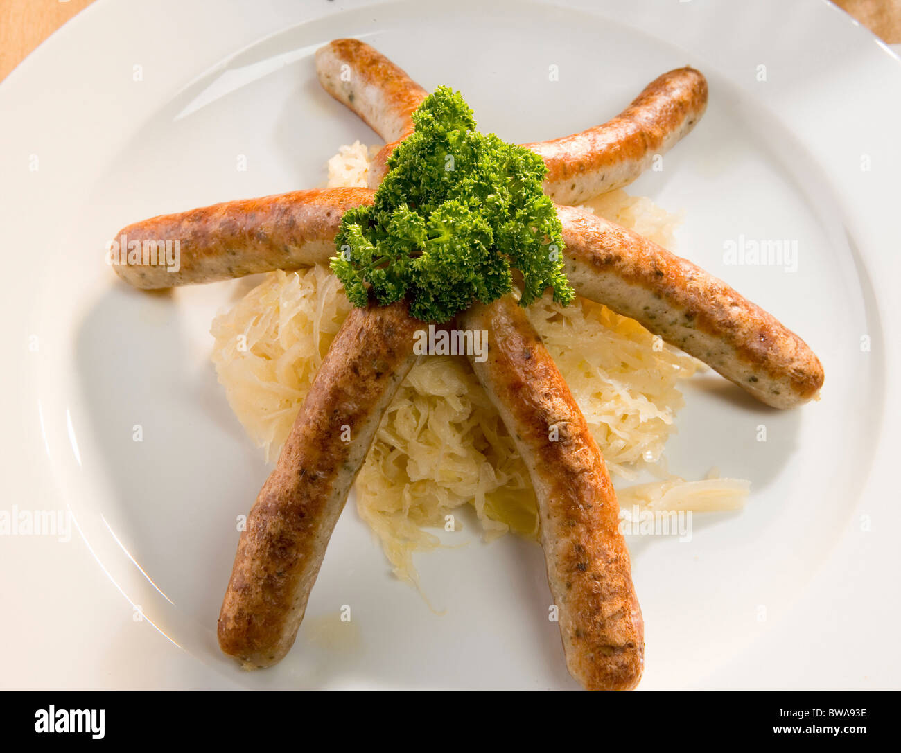 Nürnberger Rostbratwurst with Sauerkraut Stock Photo - Alamy