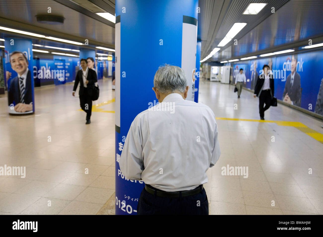 Man stopping at Tokyo's Subway, Japan Stock Photo - Alamy