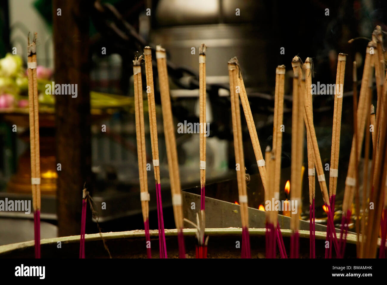 Incense sticks burning at Vietnamese temple Stock Photo - Alamy