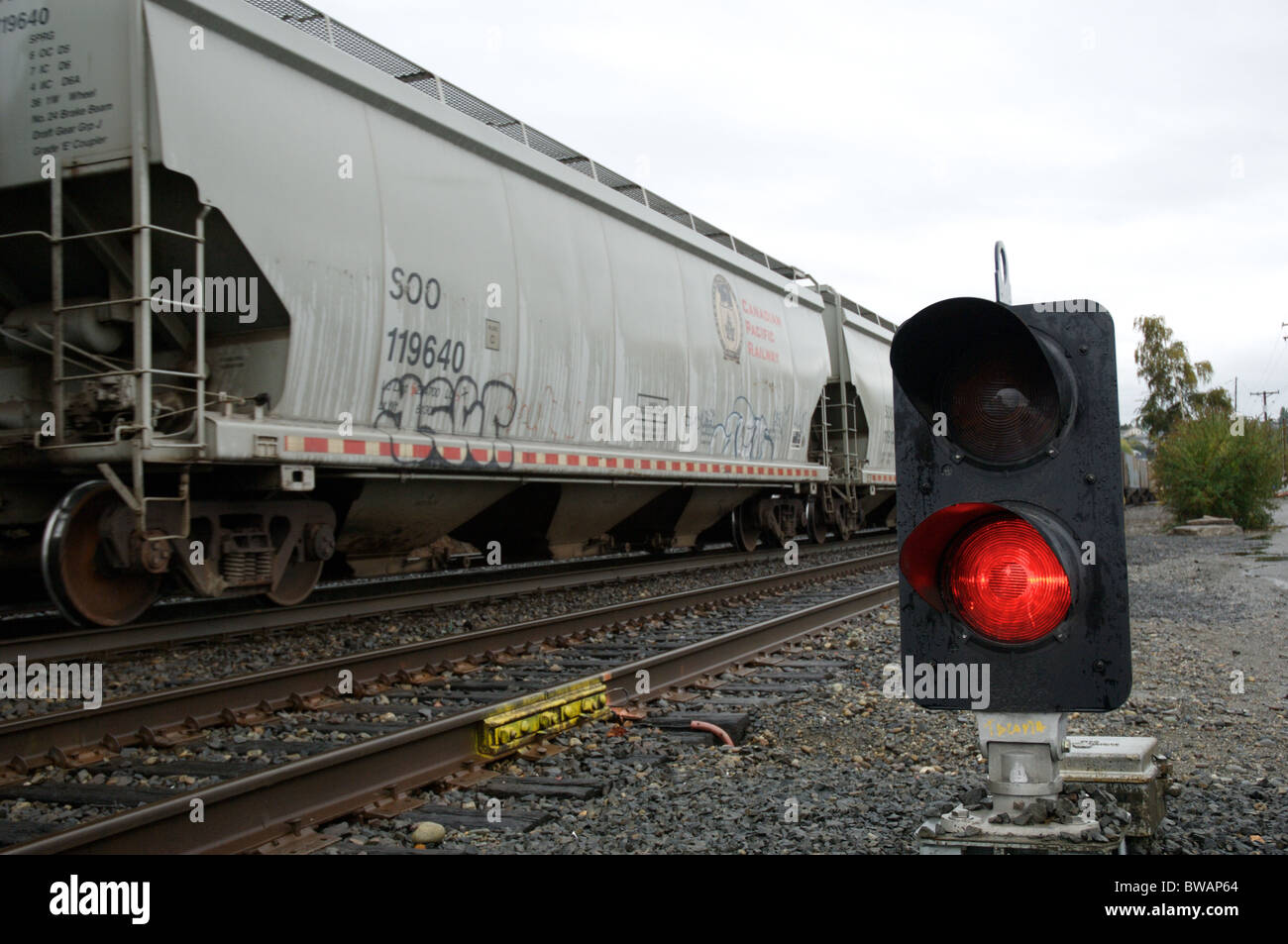 A red light warns trains to stop Stock Photo - Alamy