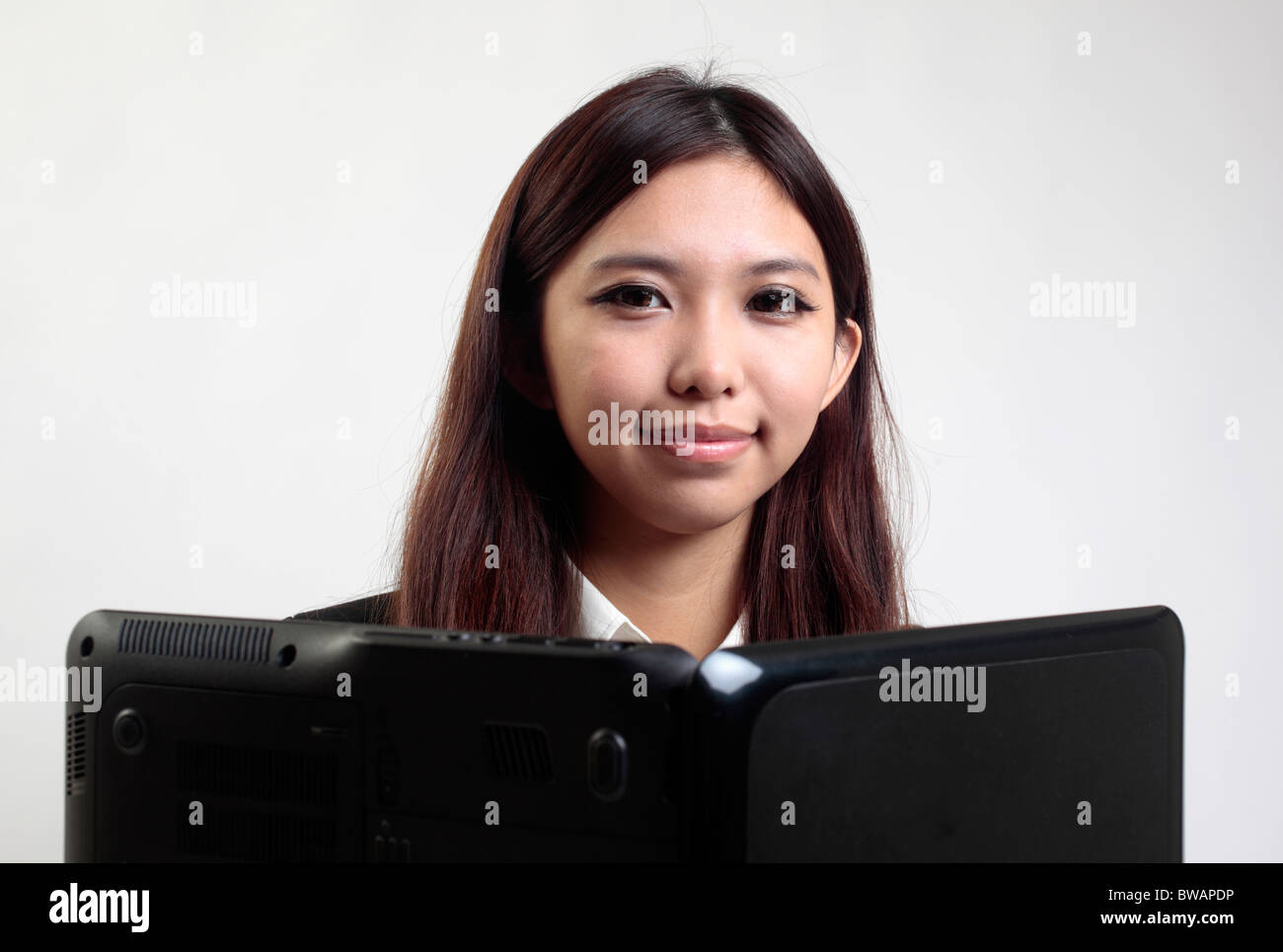 Office lady uses notebook computer Stock Photo - Alamy