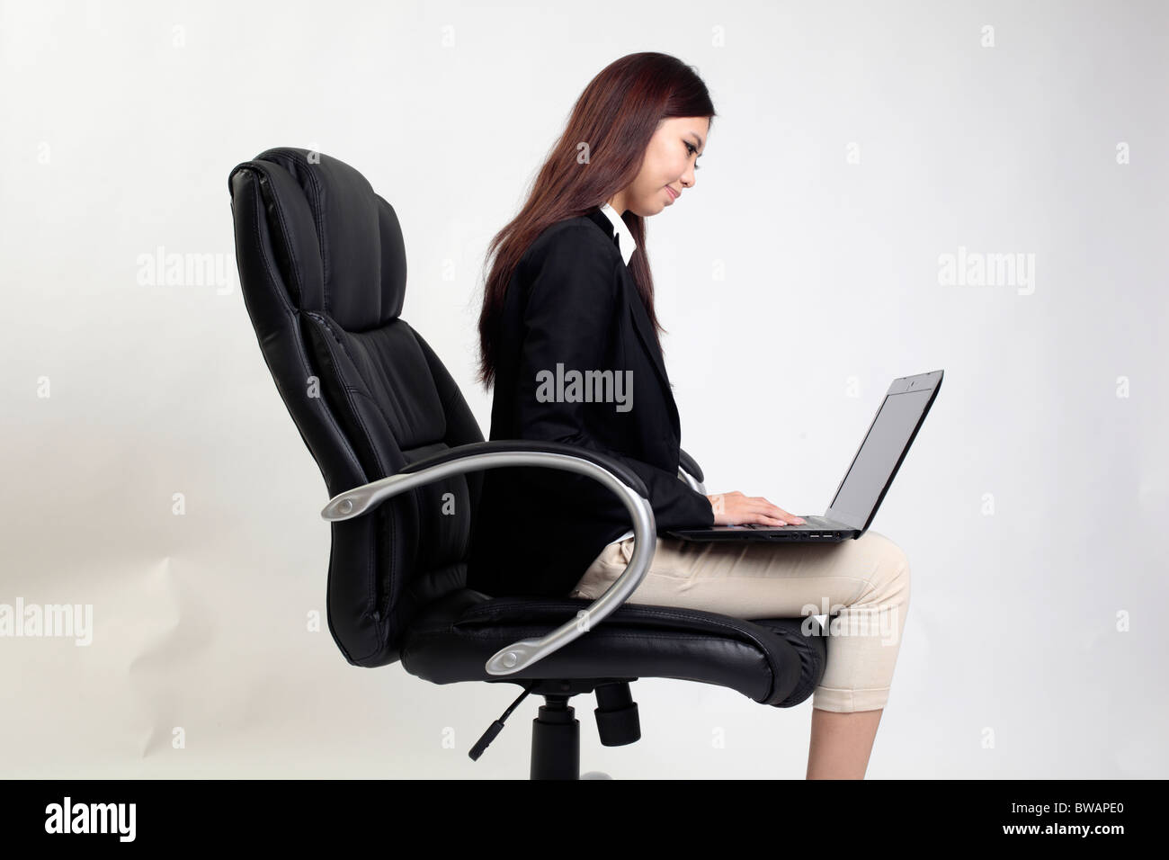 Office lady uses notebook computer Stock Photo - Alamy