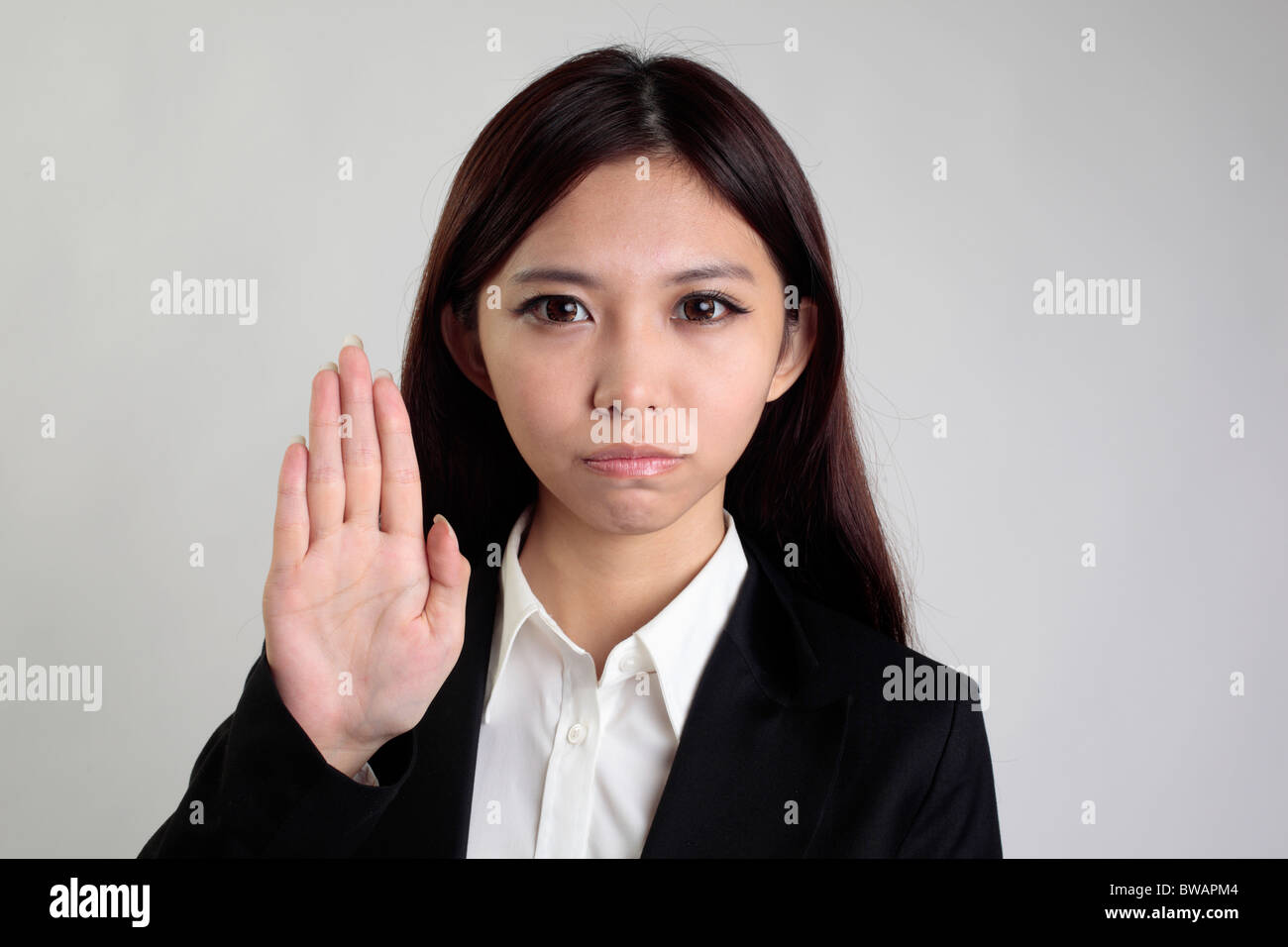 Office lady shows NO sign Stock Photo - Alamy