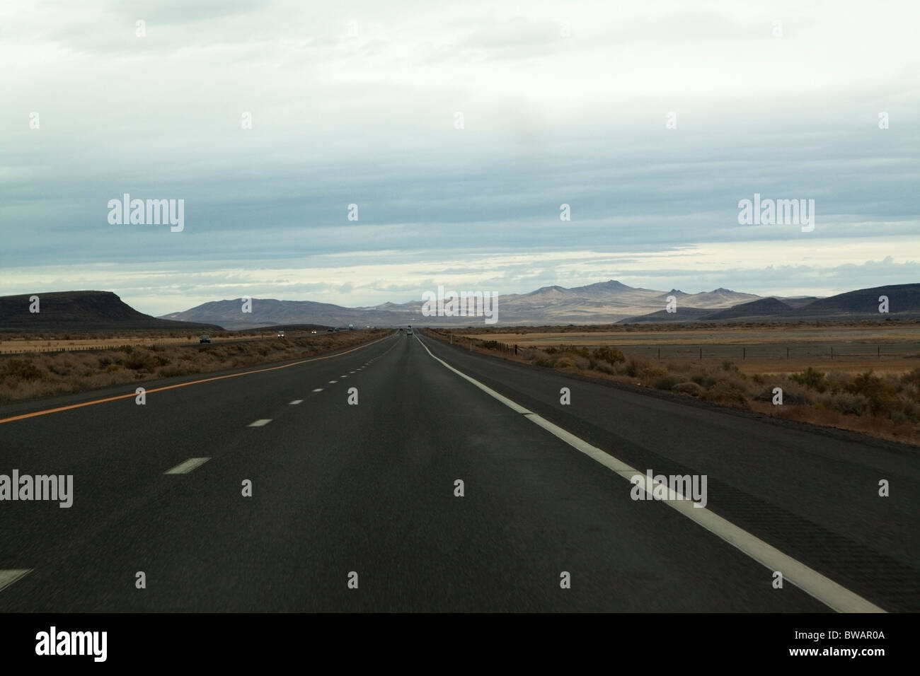 Driving on a long stretch of empty highway in northern Nevada USA Stock ...