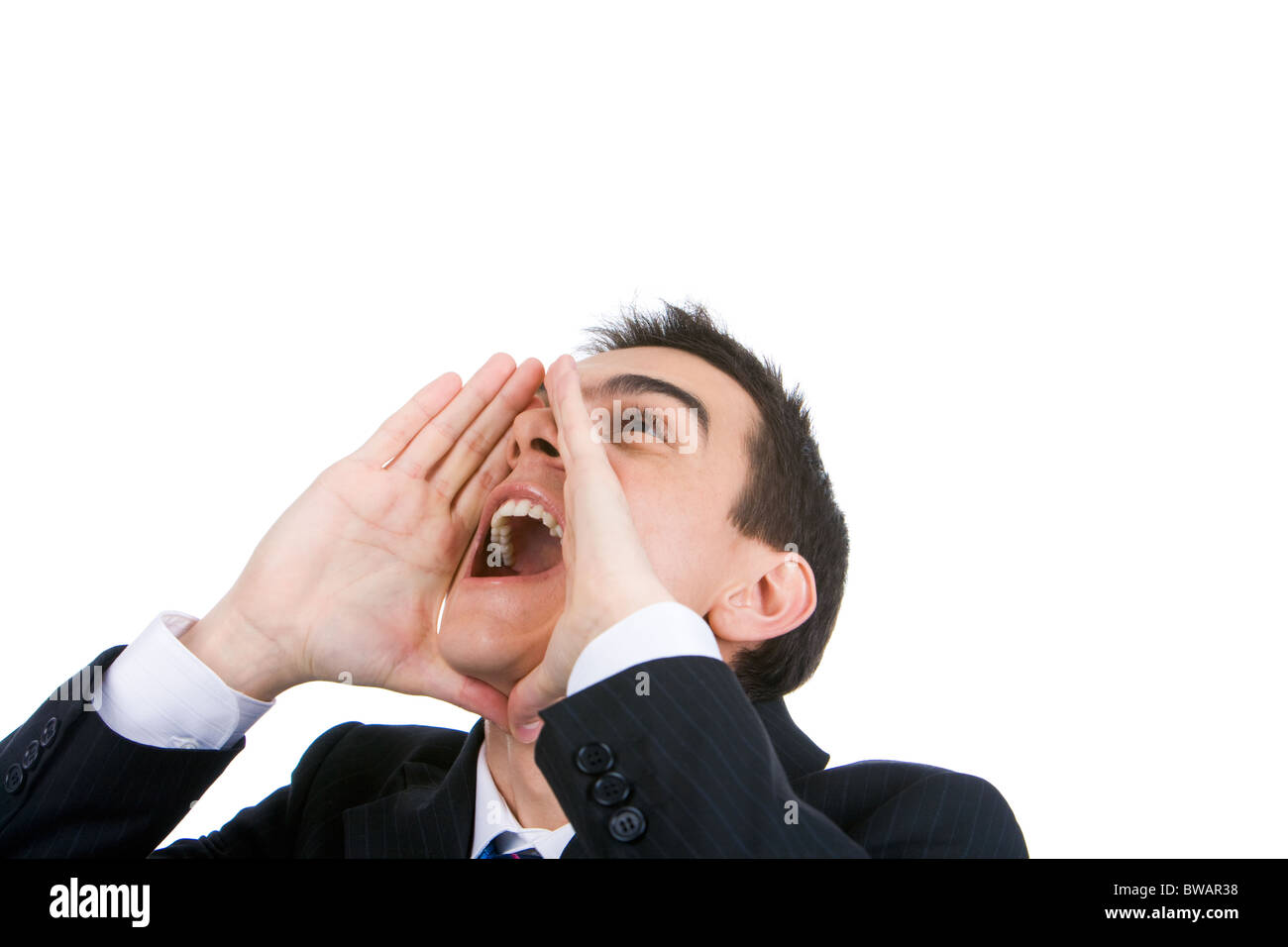 Photo of shouting man with his palms open by mouth looking upwards on ...