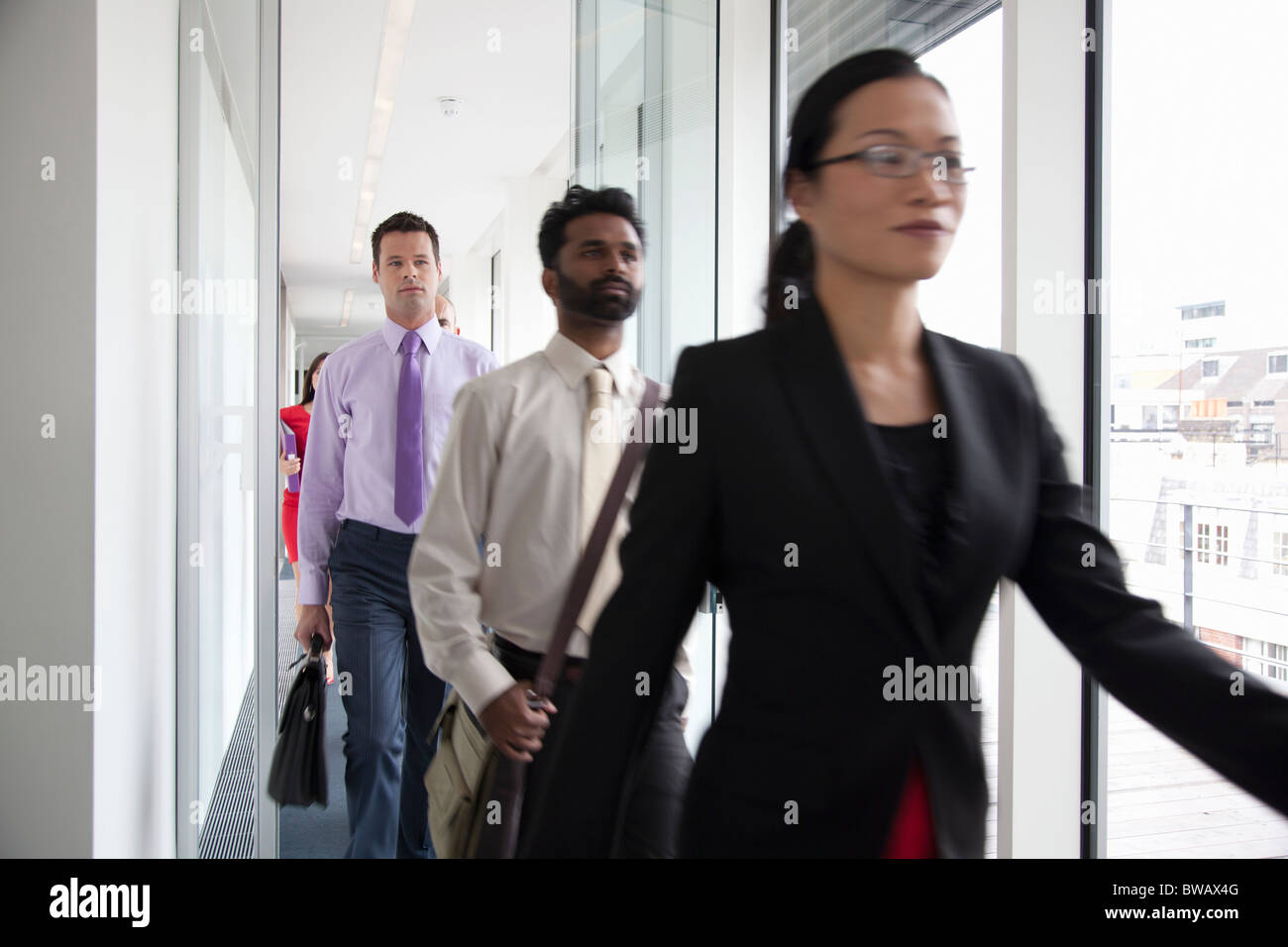 Business people rushing past camera hi-res stock photography and images ...
