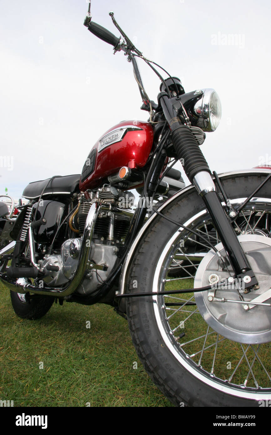 Red British Triumph motorbike Stock Photo - Alamy