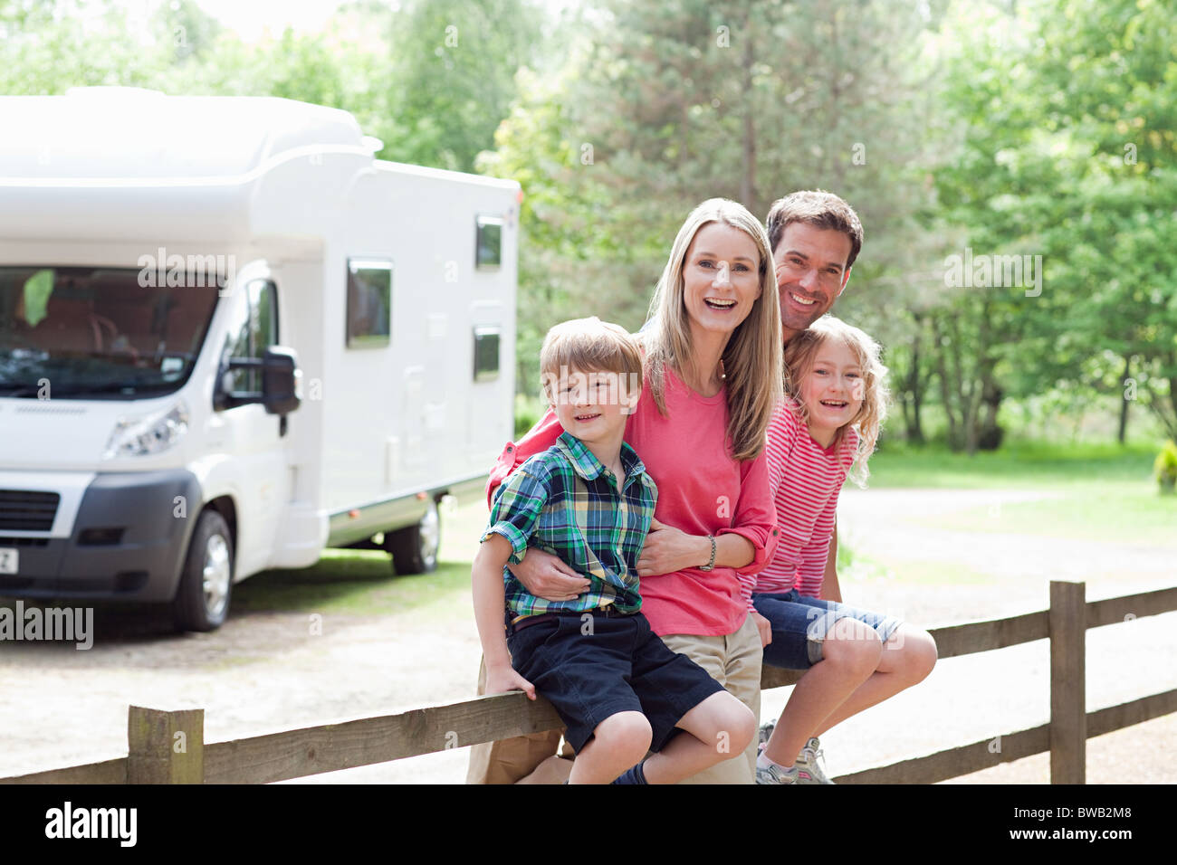 Happy family on caravan holiday Stock Photo - Alamy