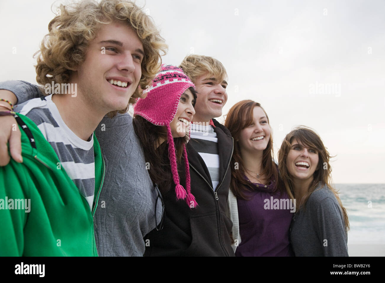 Cheerful young friends together Stock Photo - Alamy