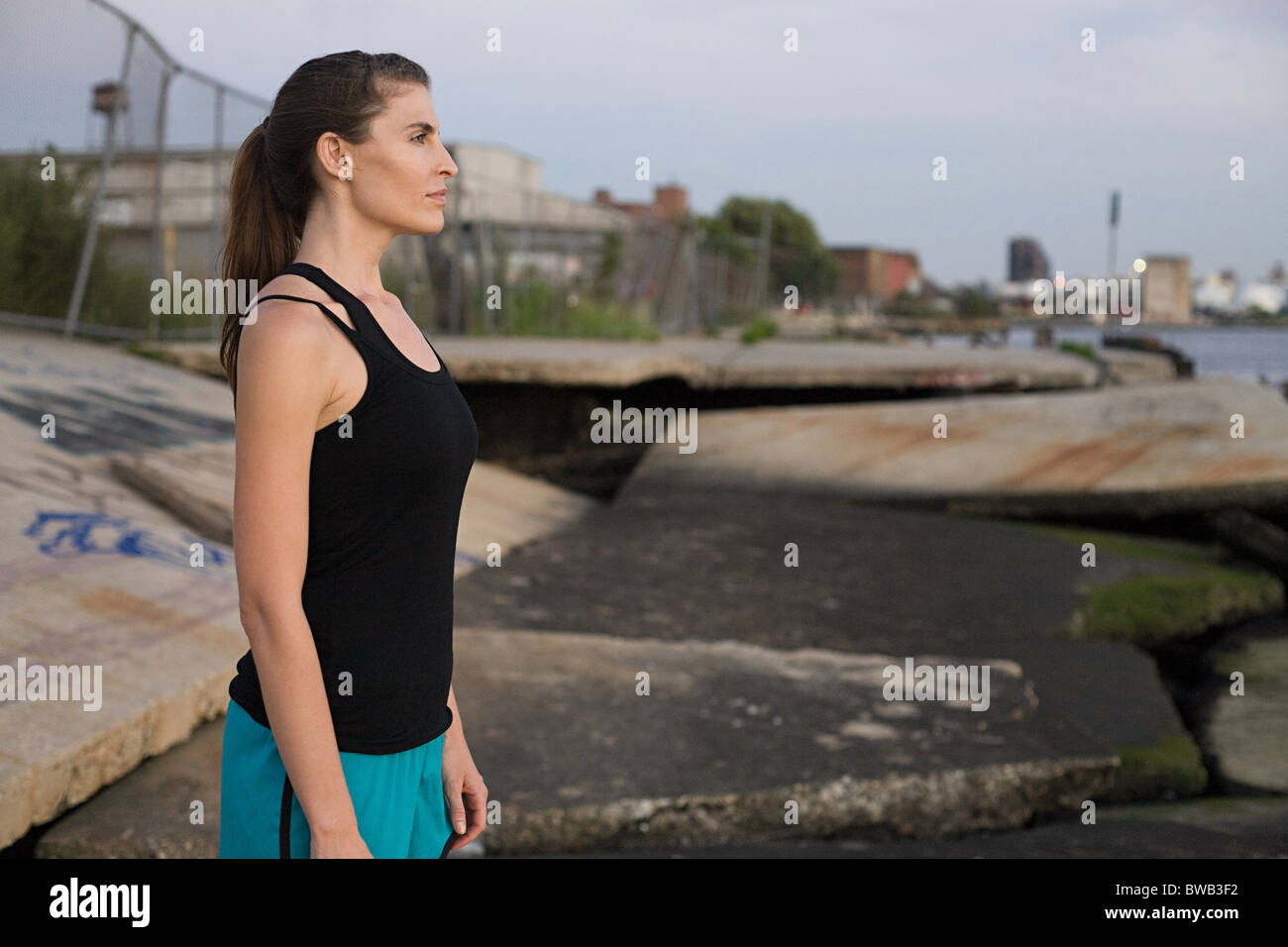 Female runner stands outdoors hi-res stock photography and images - Alamy