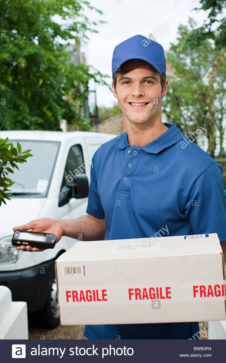 Parcel Delivery Man Stock Photos & Parcel Delivery Man Stock Images - Alamy