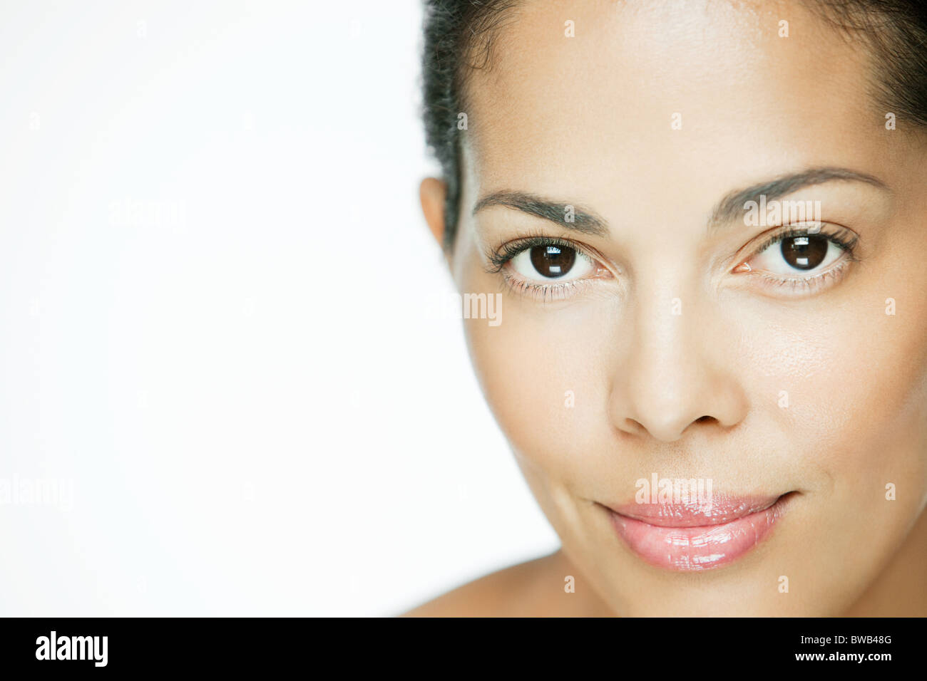 Face of a young hispanic woman Stock Photo - Alamy