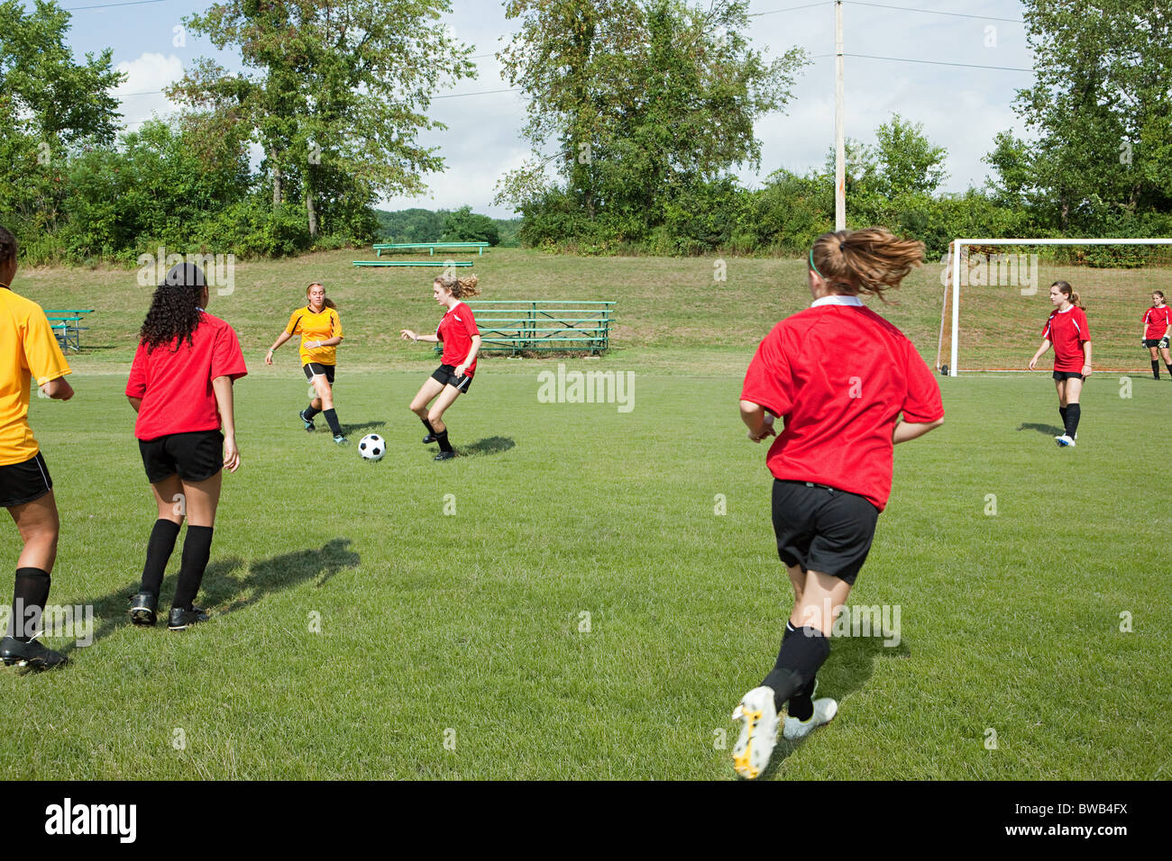 Teenage girls playing soccer Stock Photo - Alamy