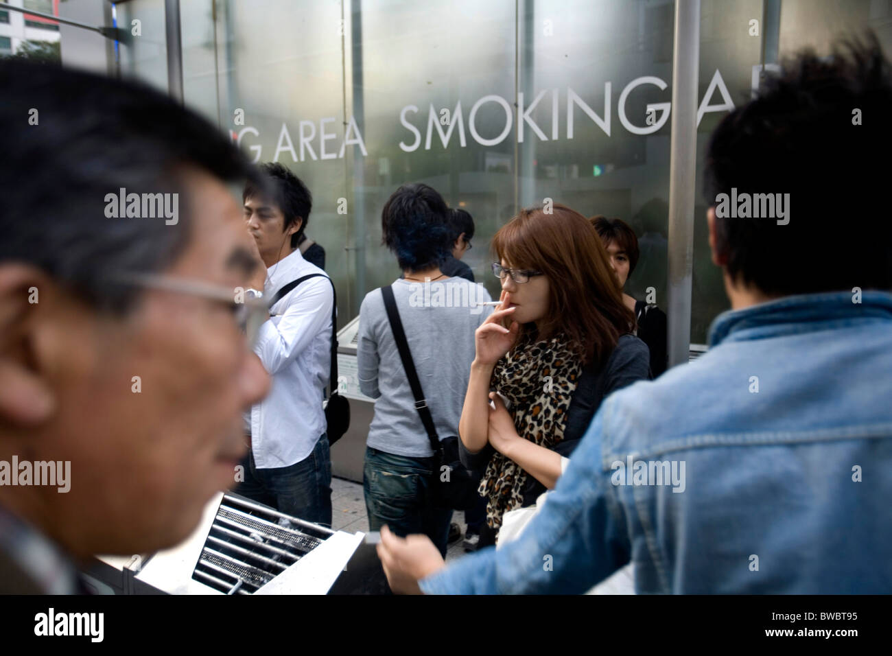 The smoking area outside Shibuya station, Tokyo, Japan Stock Photo - Alamy