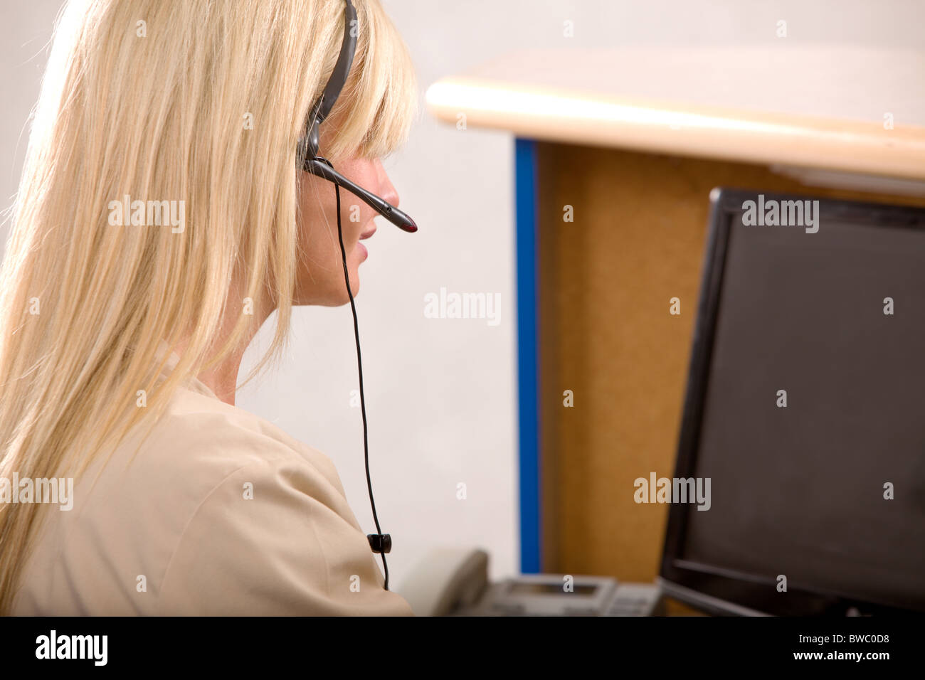 Receptionist headphones microphone hi-res stock photography and images ...