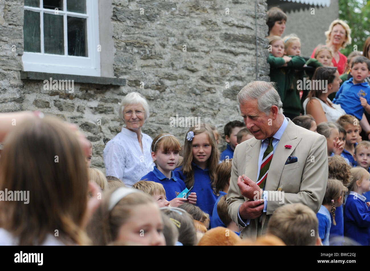 HRH Charles Prince of Wales speaks to school children on a visit to a ...