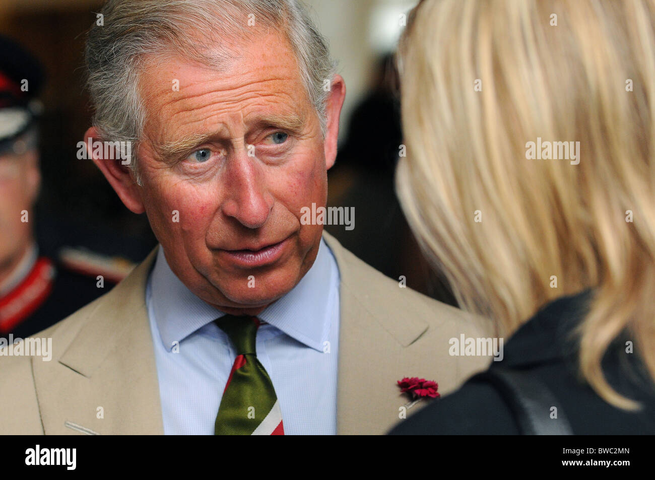 HRH Charles Prince of Wales chats to a blonde woman Stock Photo - Alamy