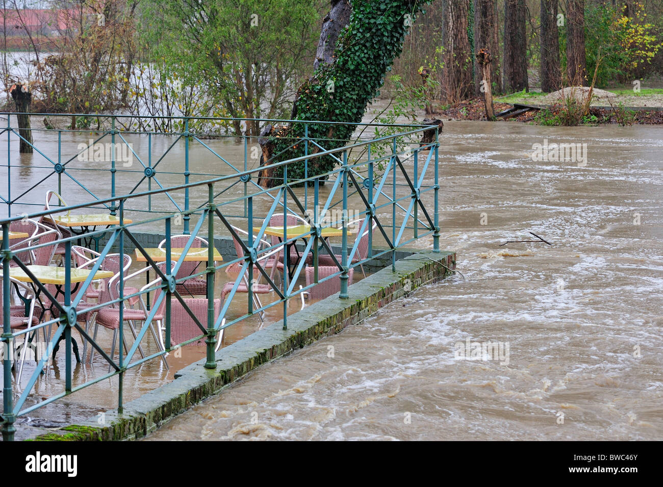 Flooded brook and terrace of restaurant at Nederzwalm, Flanders ...