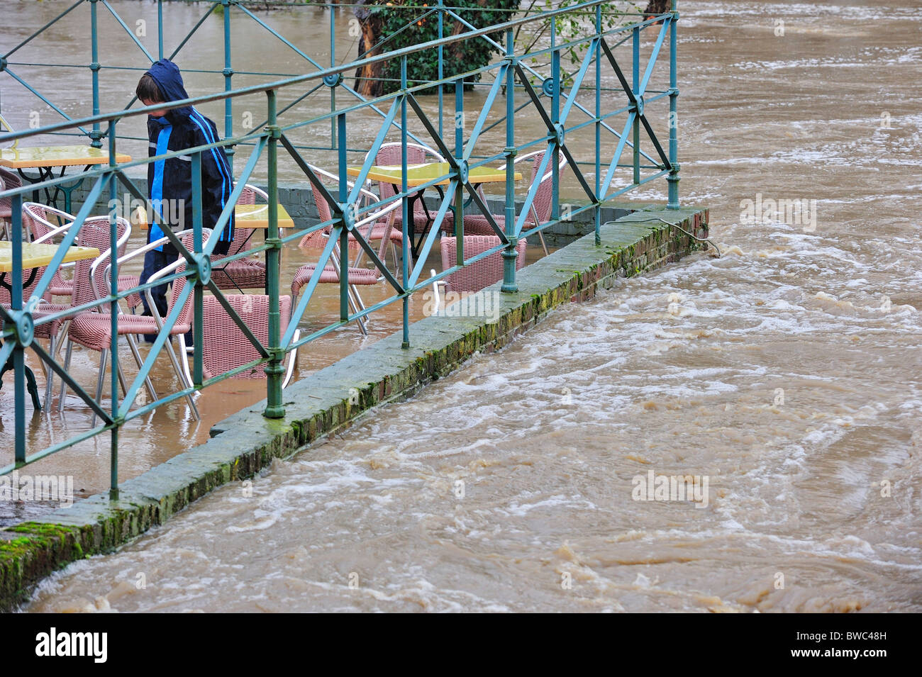 Flooded brook and terrace of restaurant at Nederzwalm, Flanders ...
