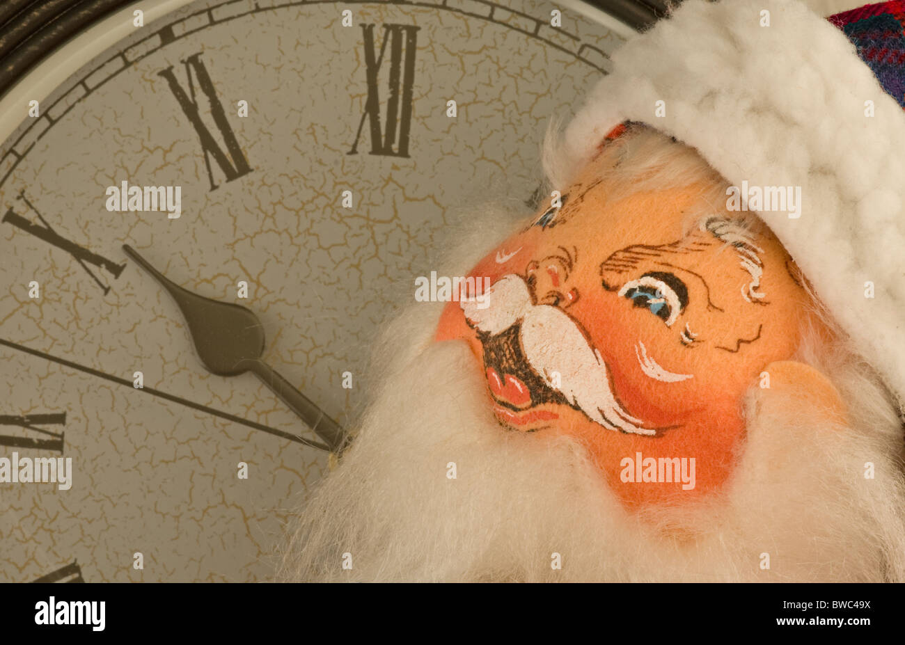 Fabric painted Santa Claus face with large clock in background. Santa ...