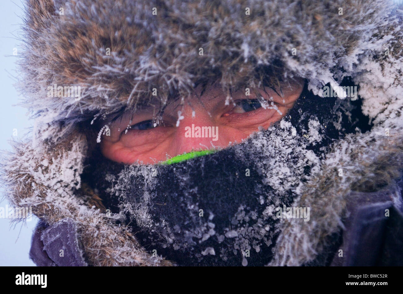 Tourist wrapped up against midwinter cold, Lapland, Sweden, -40C ...