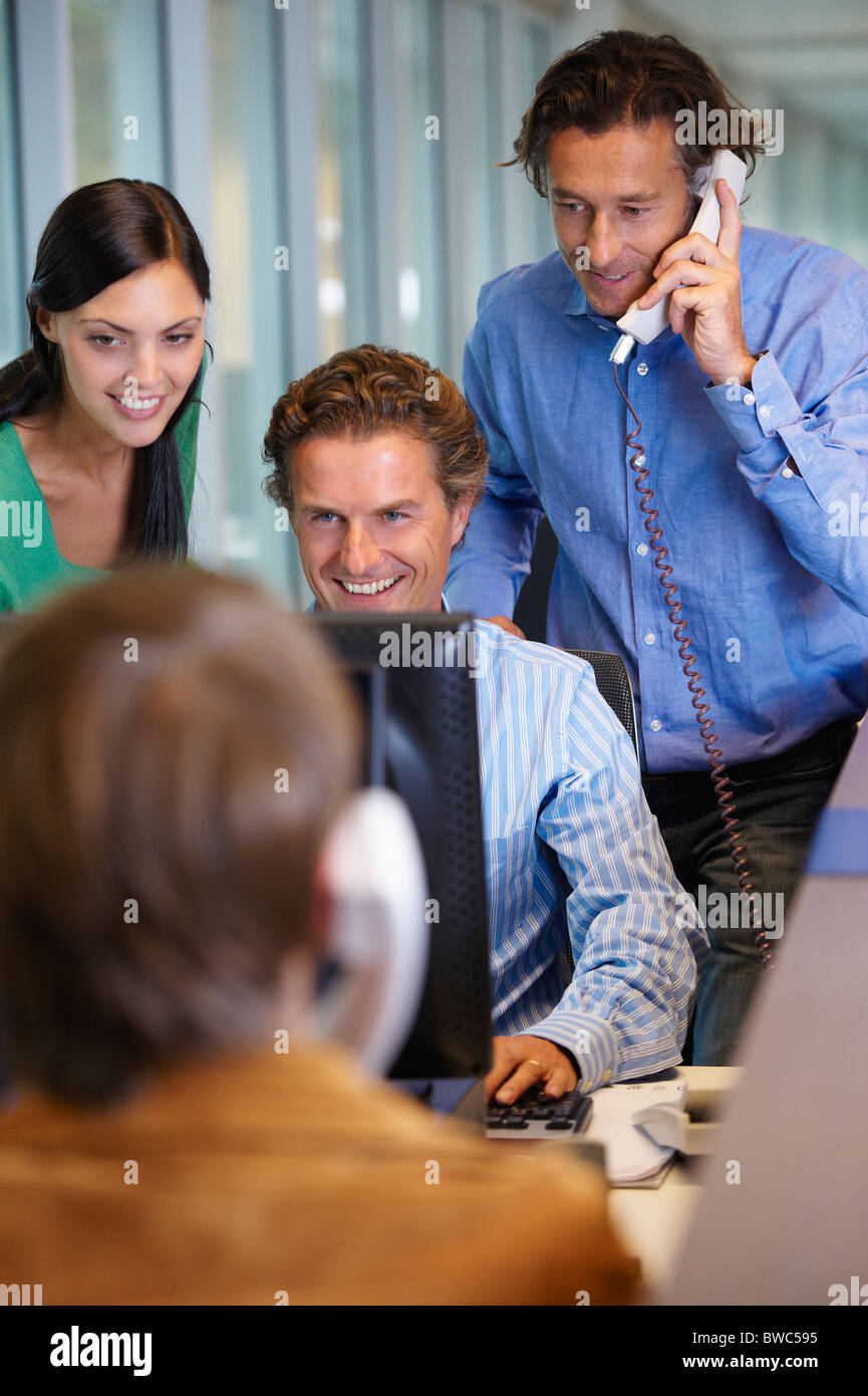 Business team closing a deal Stock Photo - Alamy