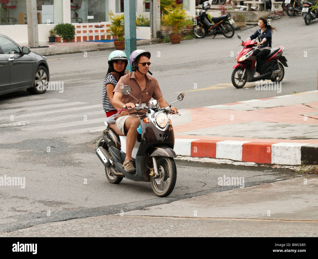 Motorbike (motorcycle, scooter) riders of Bangkok, Thailand October ...