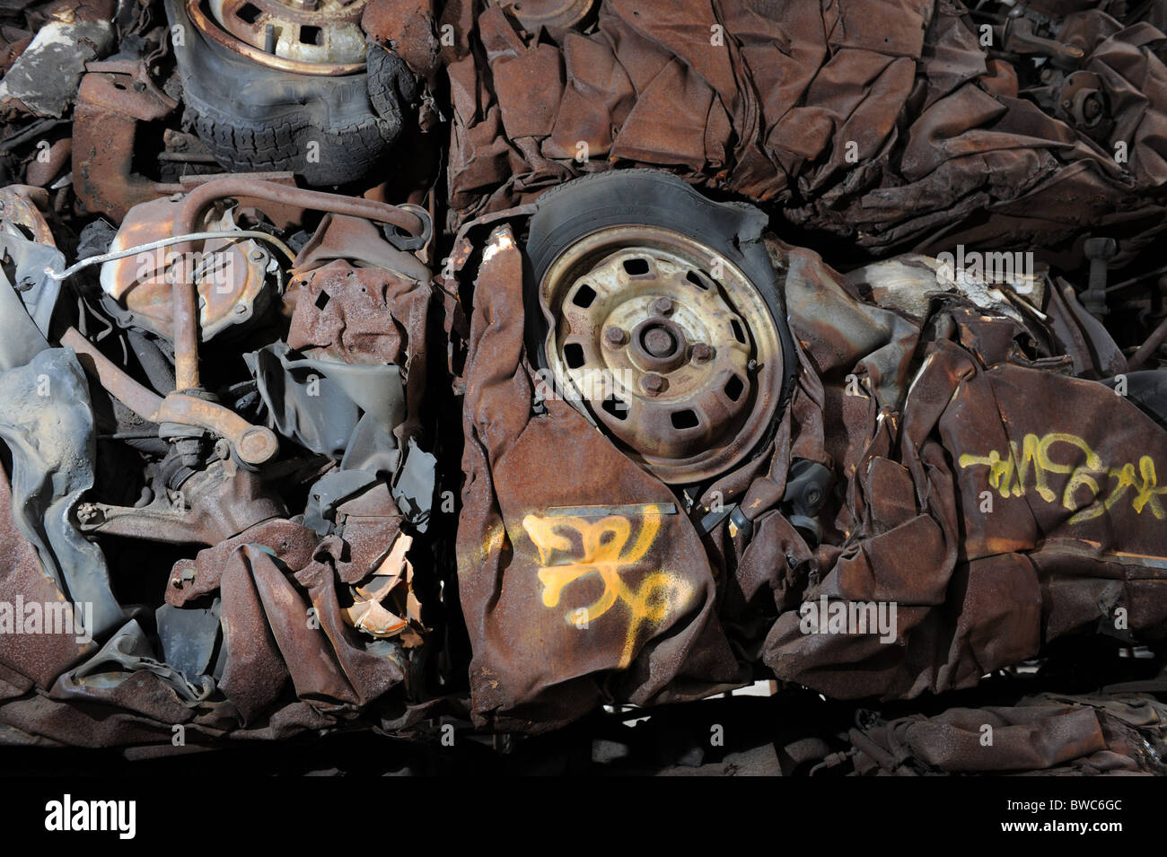 Scrapped cars crushed Stock Photo - Alamy