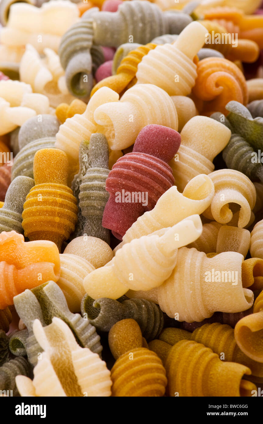 object on white - food colored pasta close up Stock Photo - Alamy
