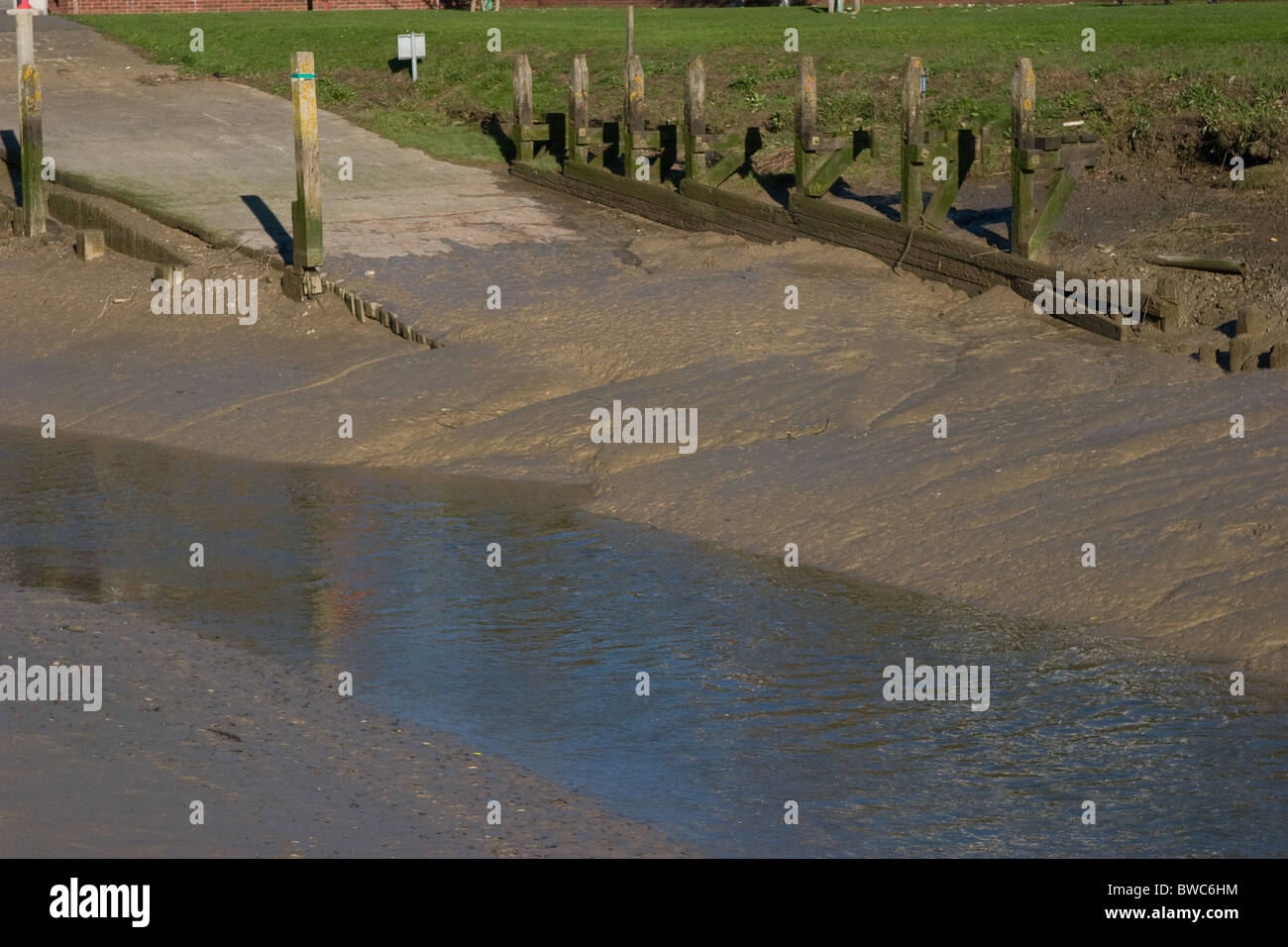 silted river bank and bed in bright winter sunshine Stock Photo - Alamy