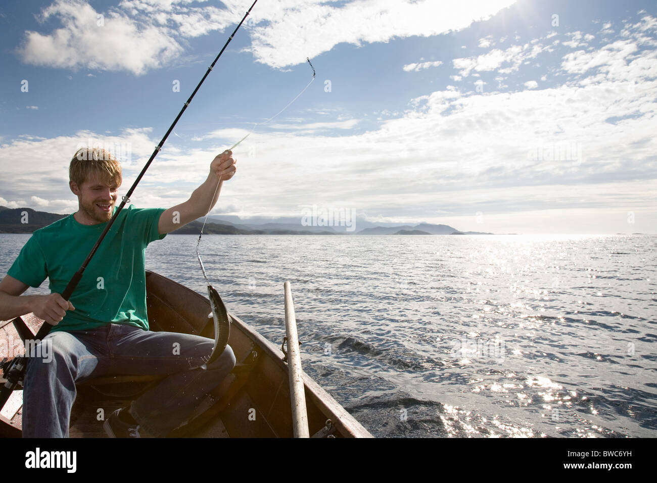 Person fishing boat hi-res stock photography and images - Alamy