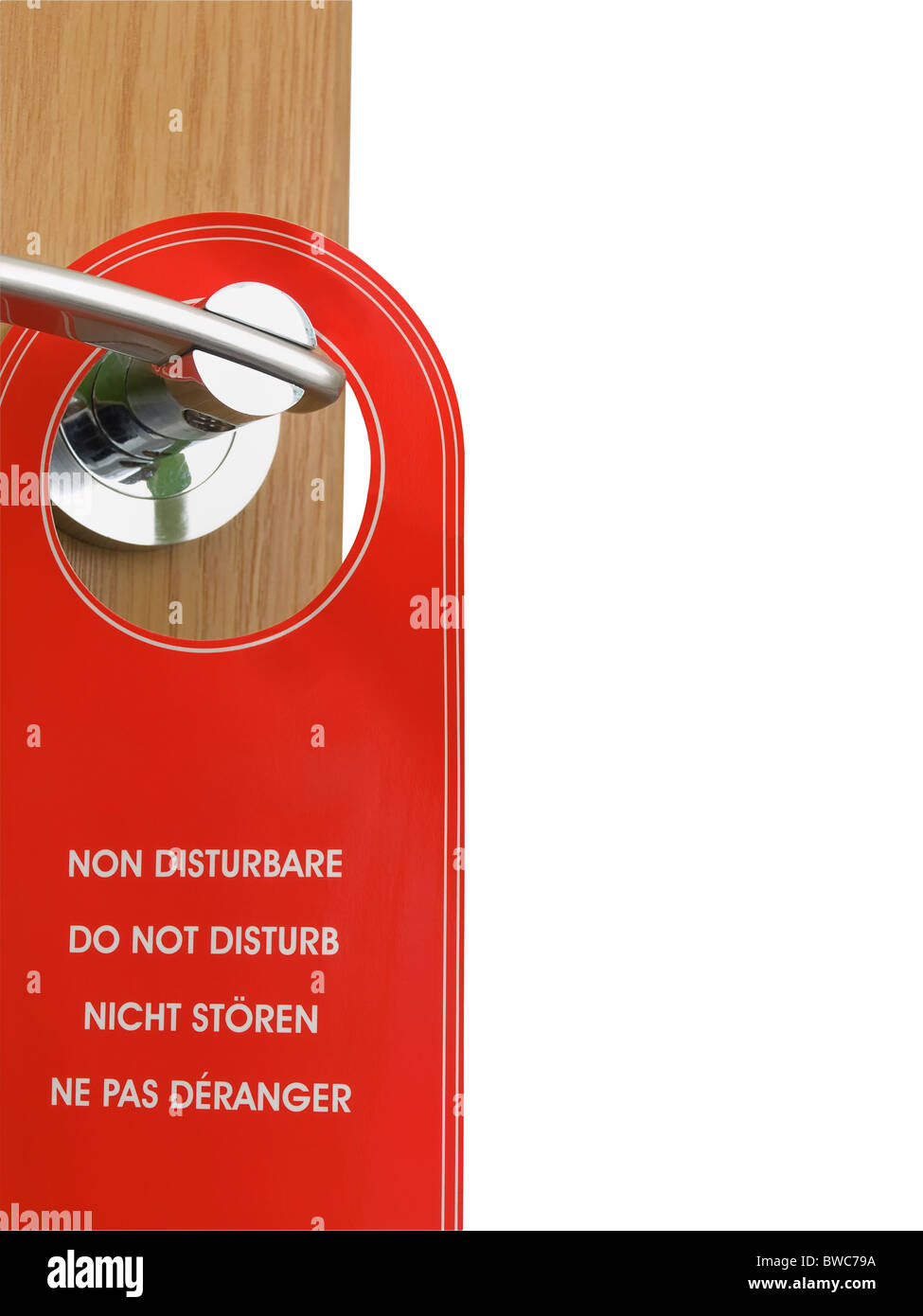 closeup of the opened door with do not disturb sign hanging on the door ...